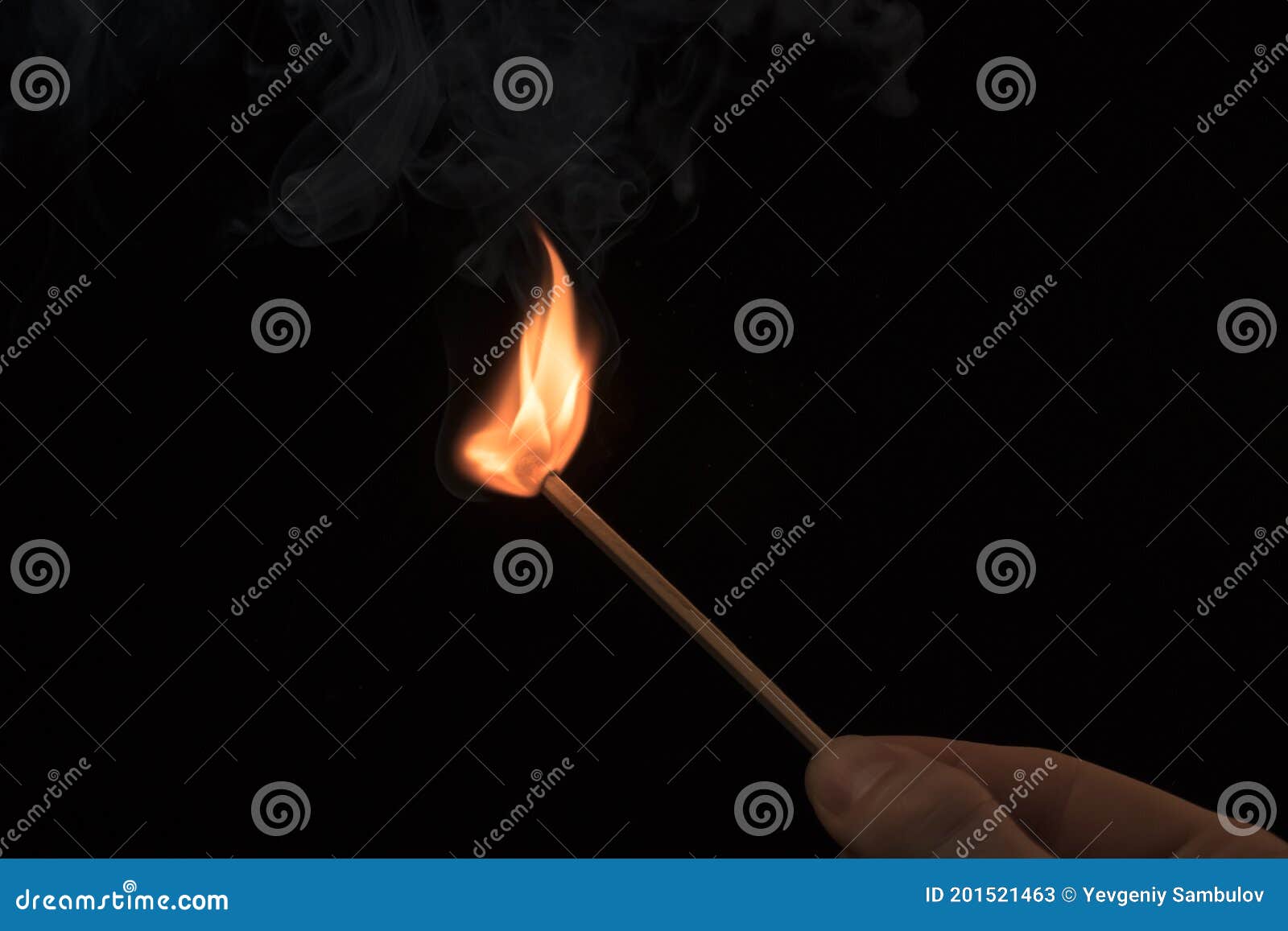 Lighted Match In A Woman`s Hand And A Fire Alarm On A Blue Background ...
