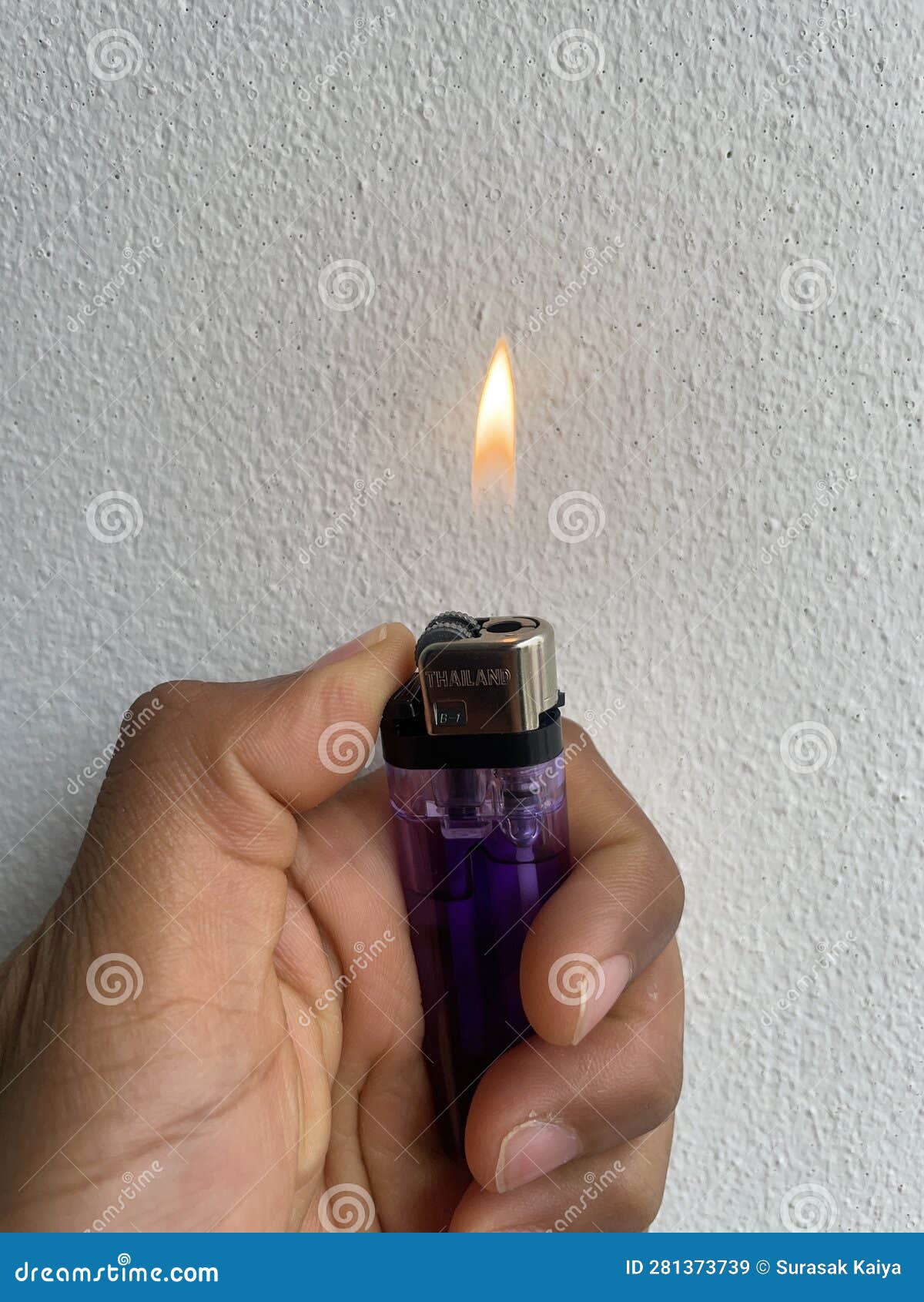 Hand holding lighter stock image. Image of black, purple - 281373739