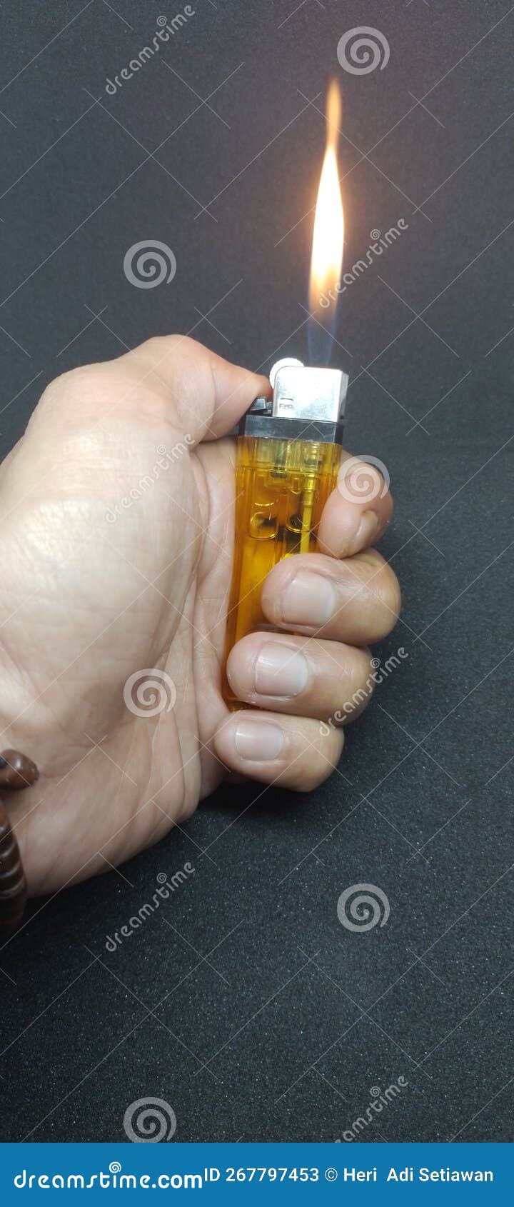 Hand is Holding a Lighter and Lighting it Stock Image - Image of organ ...