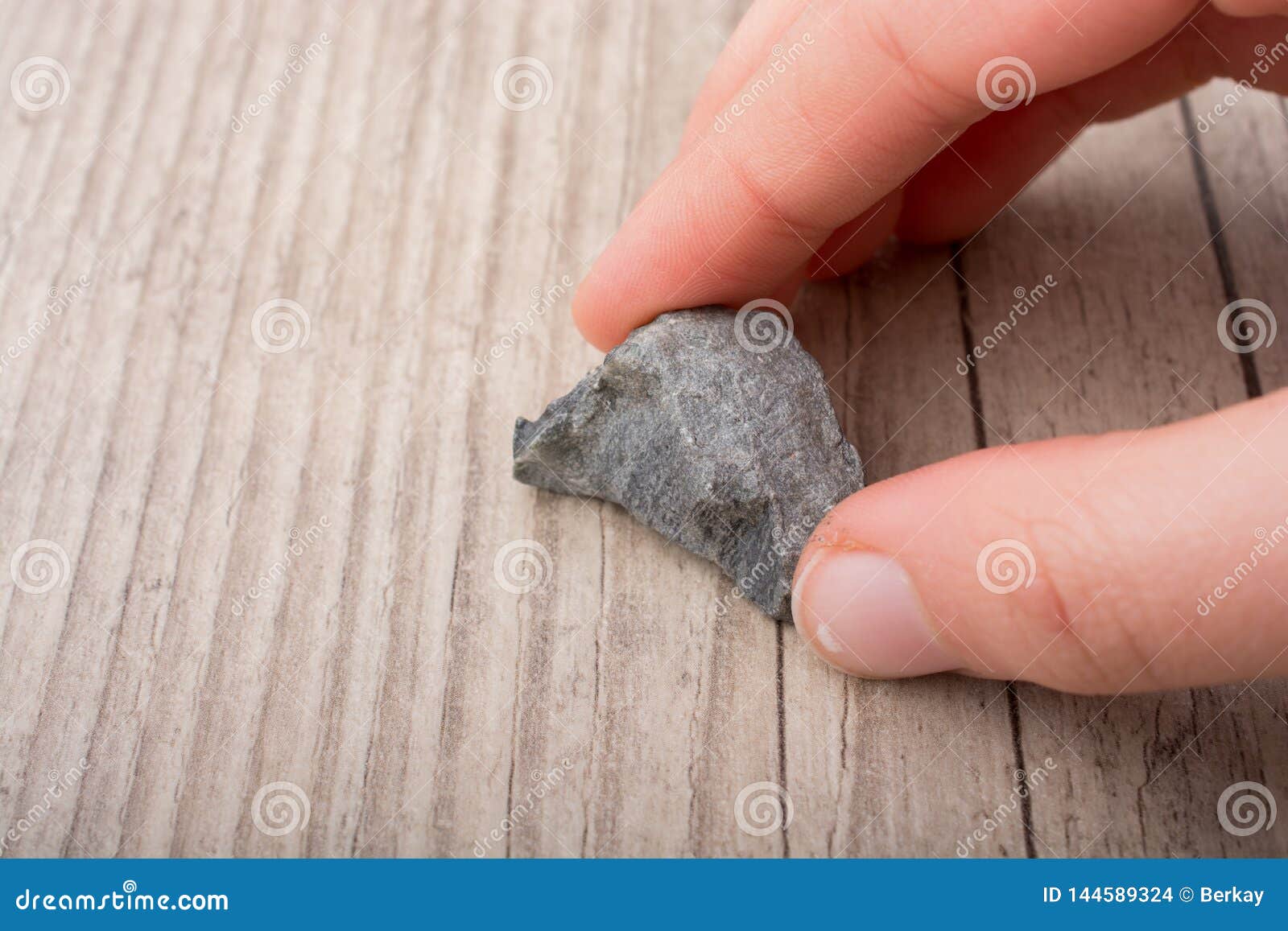 Hand Holding Little Stone in Hand Stock Photo - Image of natural, stone ...