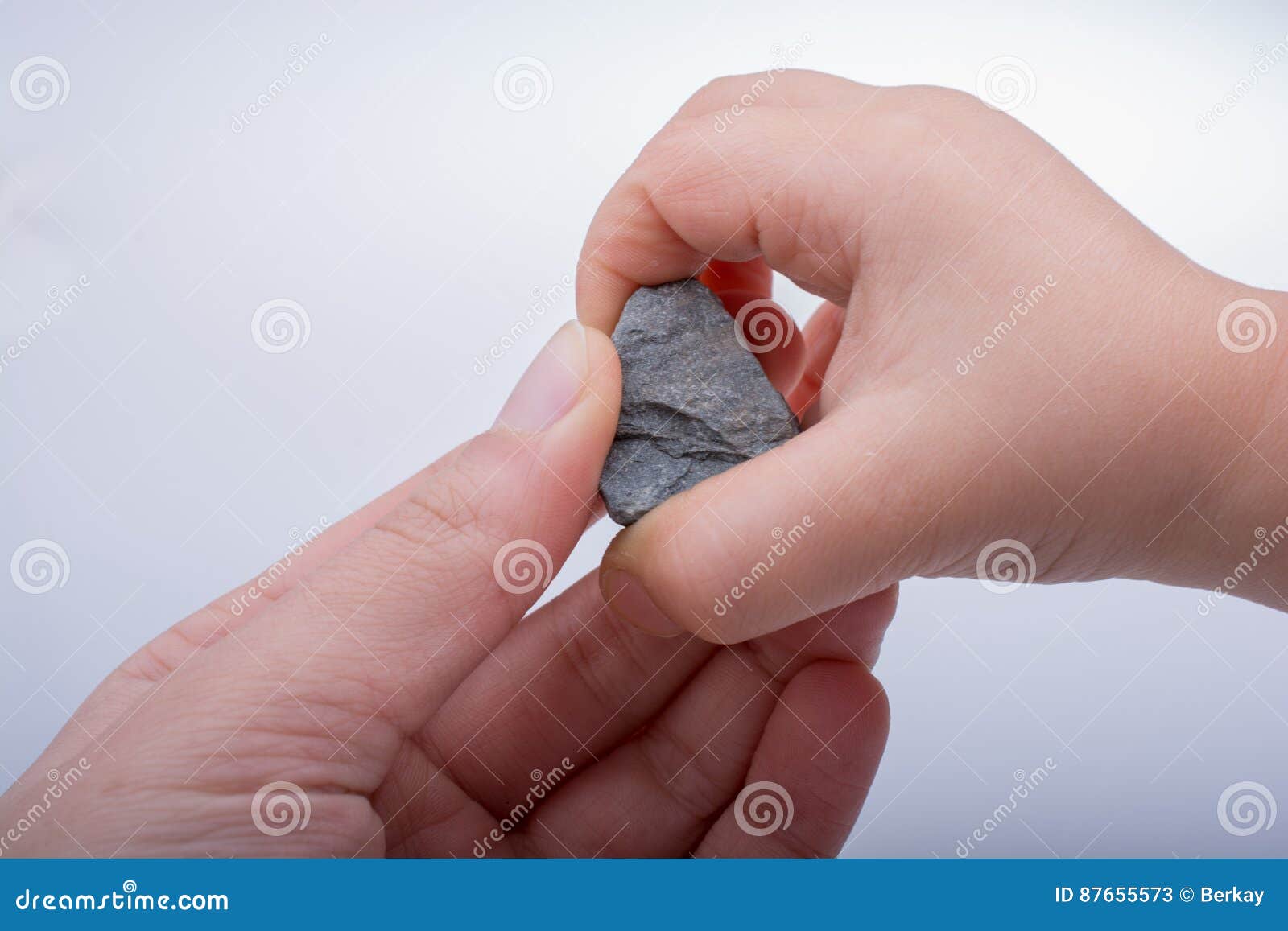 Hand Holding Little Stone in Hand Stock Image - Image of stones, hand ...
