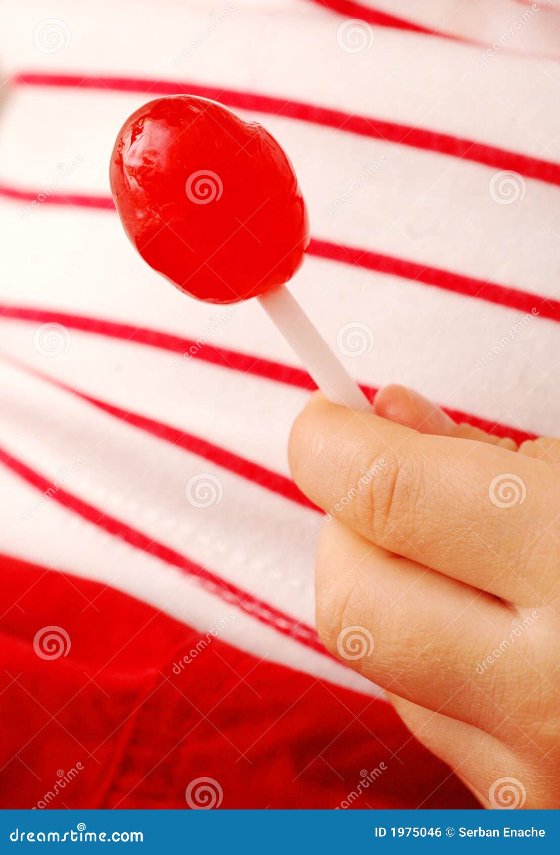 Hand Holding Lollipop stock photo. Image of hold, reward - 1975046