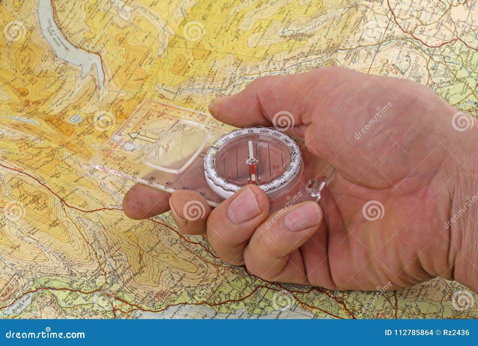 Hand, compass and map stock photo. Image of compass - 112785864