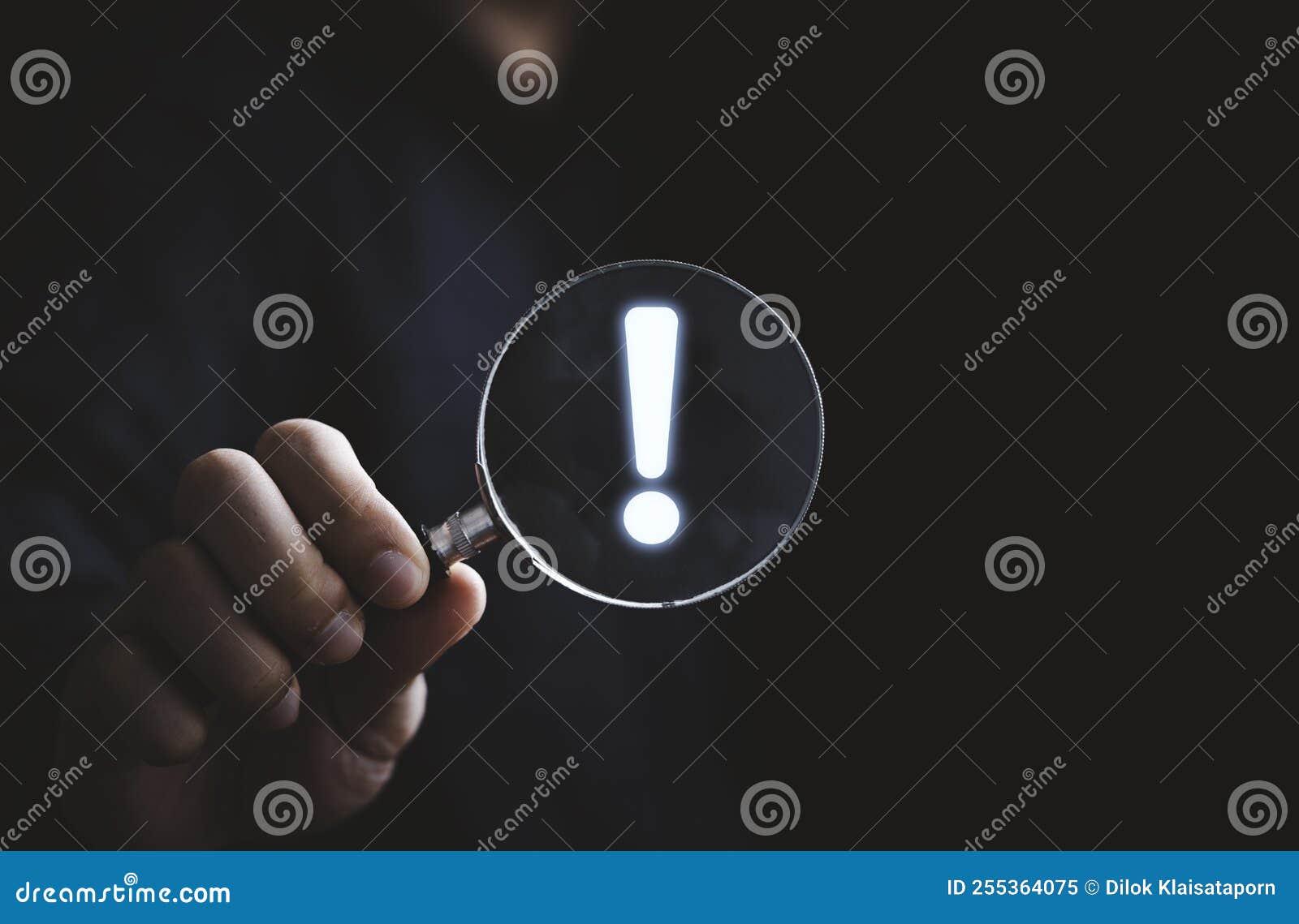 Hand Holding Magnifier Glass with Red Triangle Caution Warning Sign for ...