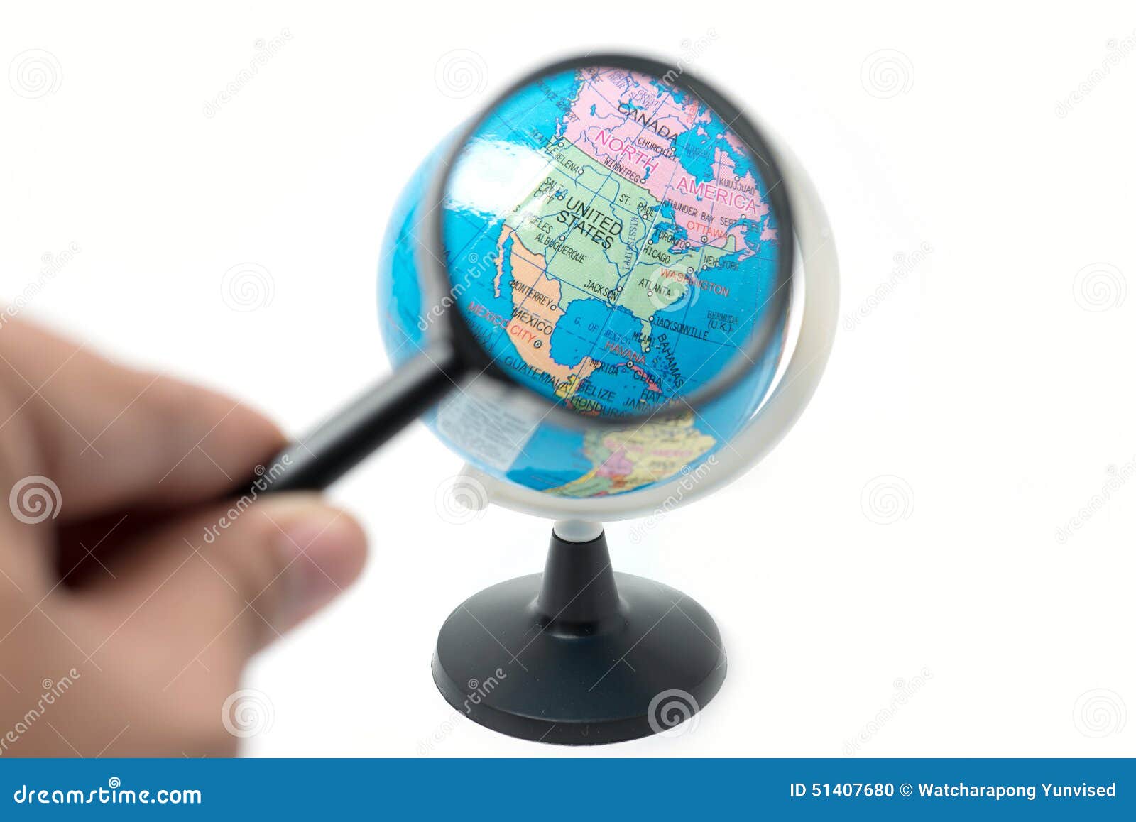 Hand Holding Magnifying Glass Over Earth Globe Stock Photo - Image of ...
