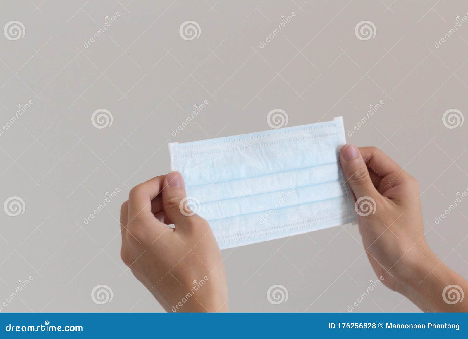 The hand holds the mask stock photo. Image of chinese - 176256828