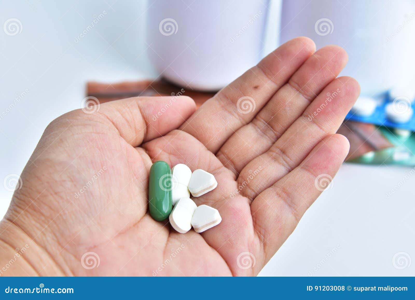 Hand holding medicine. stock photo. Image of healthcare - 91203008