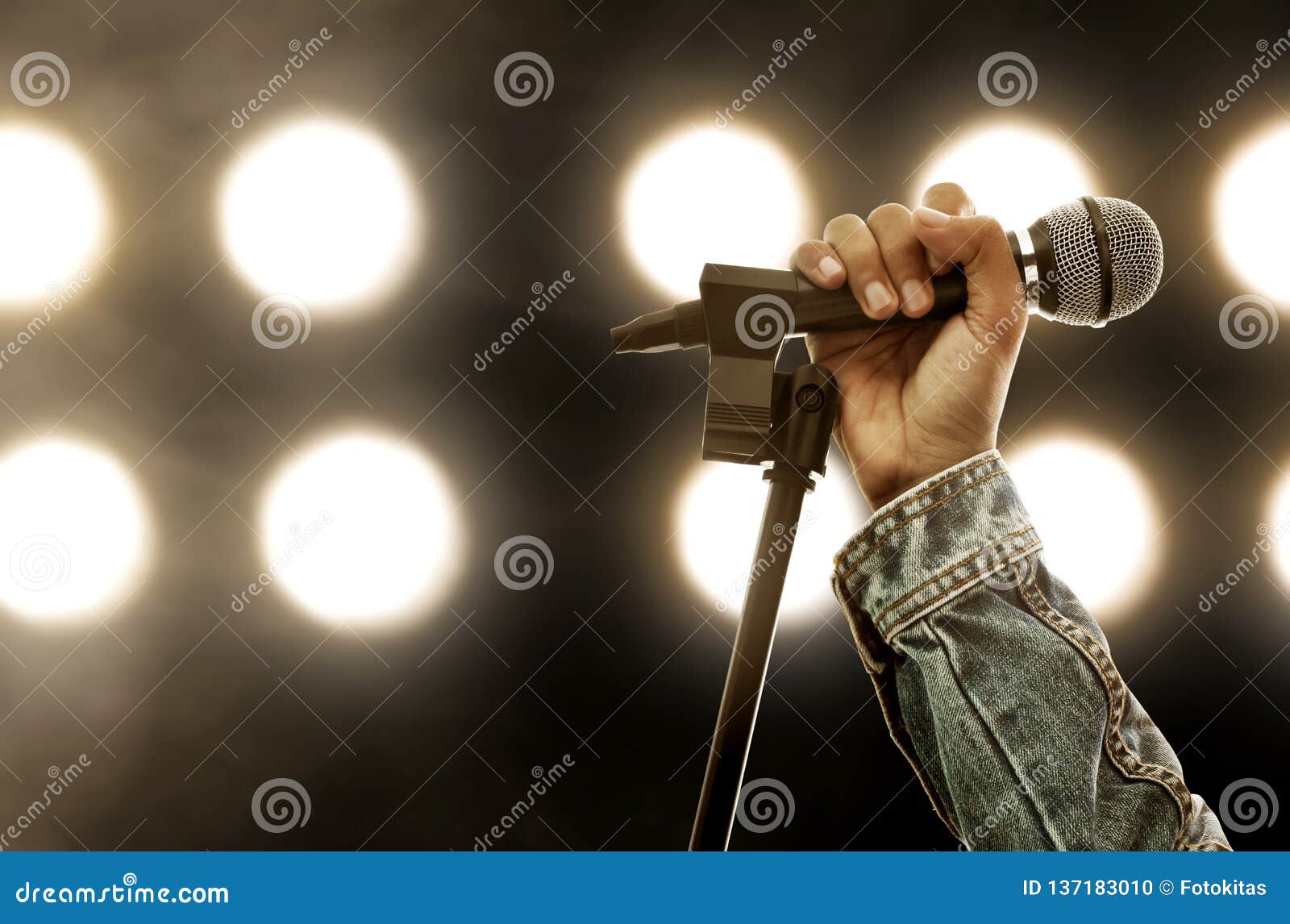 Hand Holding Microphone on Stage Stock Photo - Image of popular, media ...