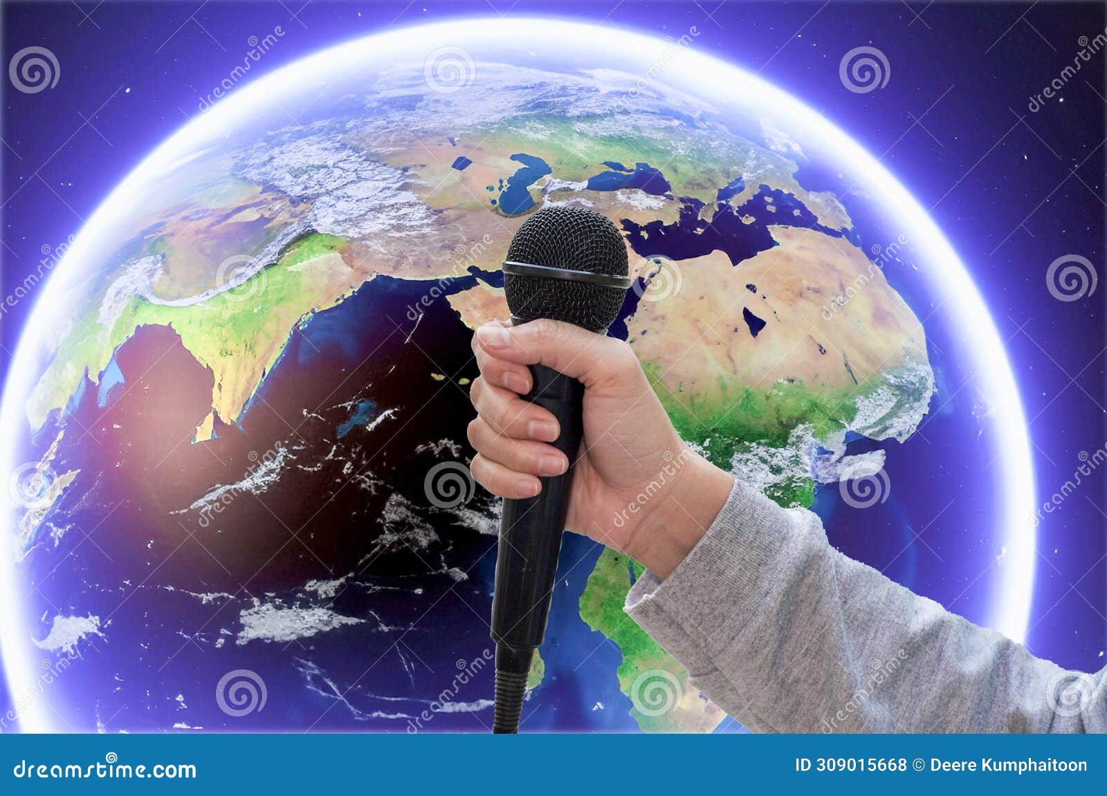 Hand Holding Microphone on World Communication Earth. Stock Photo ...