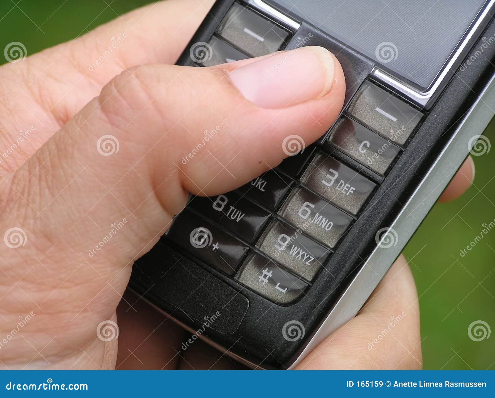Hand holding mobile phone stock image. Image of finger - 165159