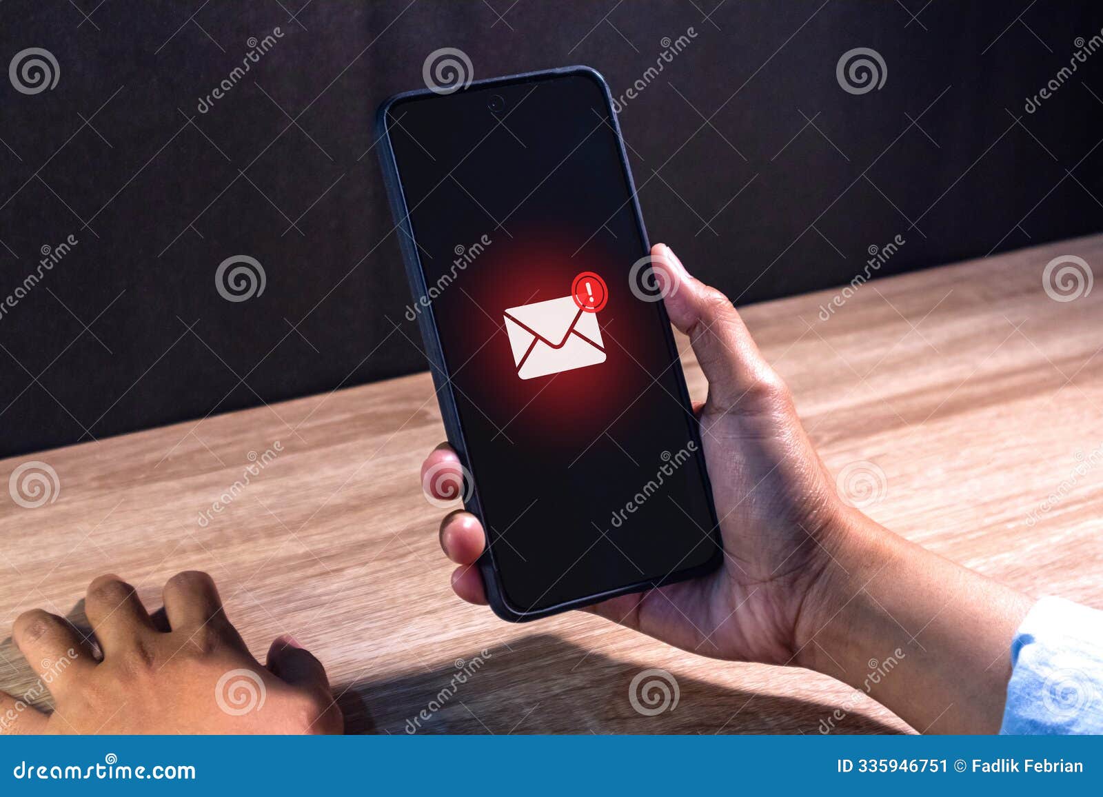 Hand Holding a Mobile Phone with Email Spam Notification Alert with ...