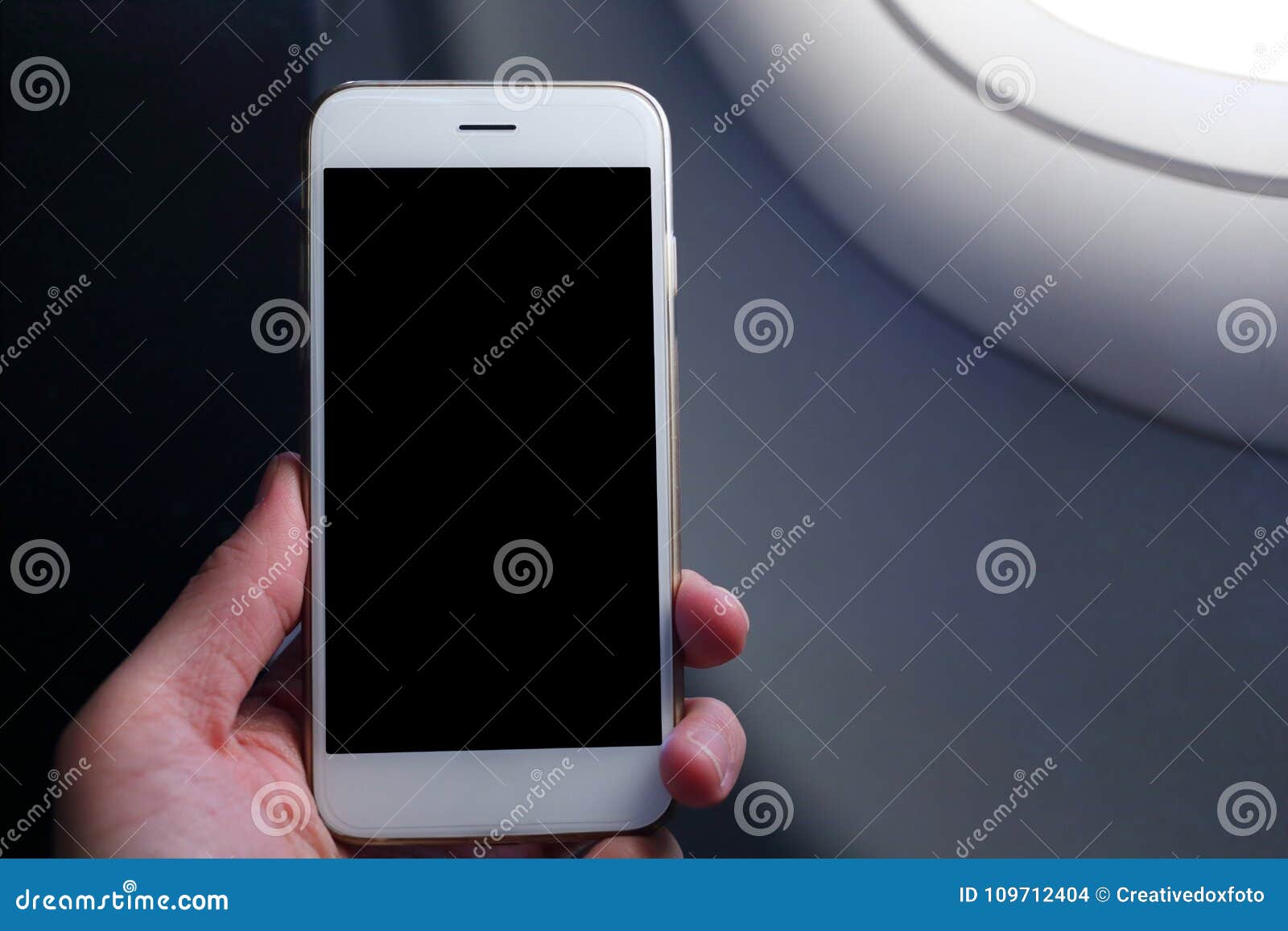 Hand Holding Mock Up Smartphone with Plane Window Background Stock ...