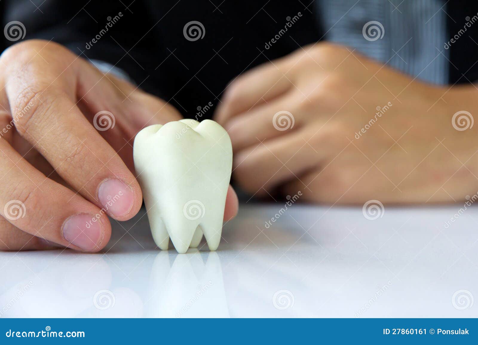 Hand holding molar stock image. Image of concept, molar - 27860161