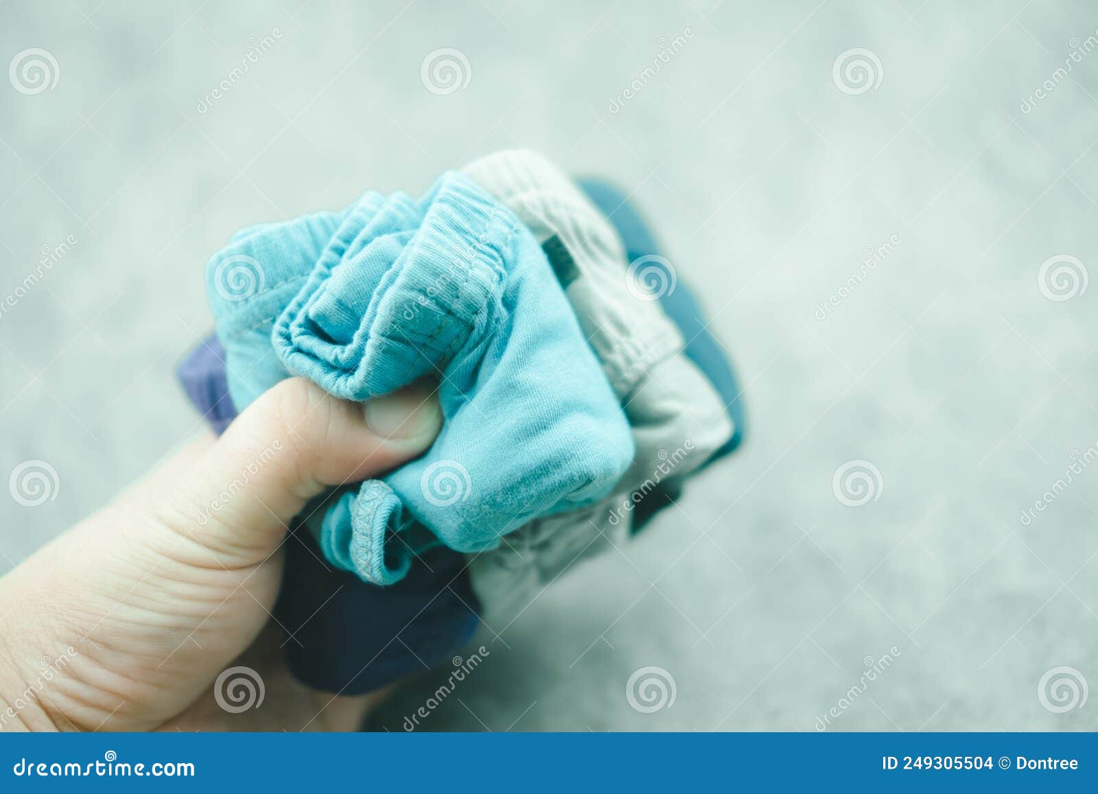 Hand Holding New Men Underwear Stock Photo - Image of underpants ...