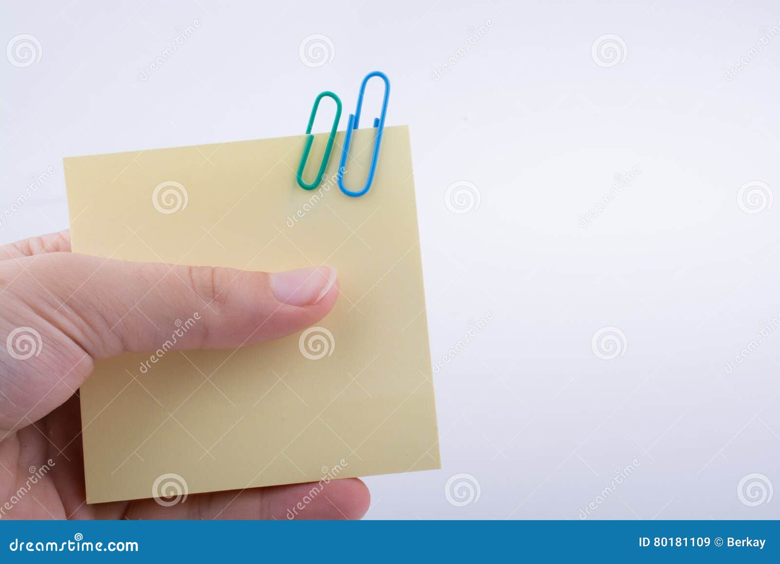 Hand Holding a Note Paper with Paper Clips Stock Image - Image of text ...