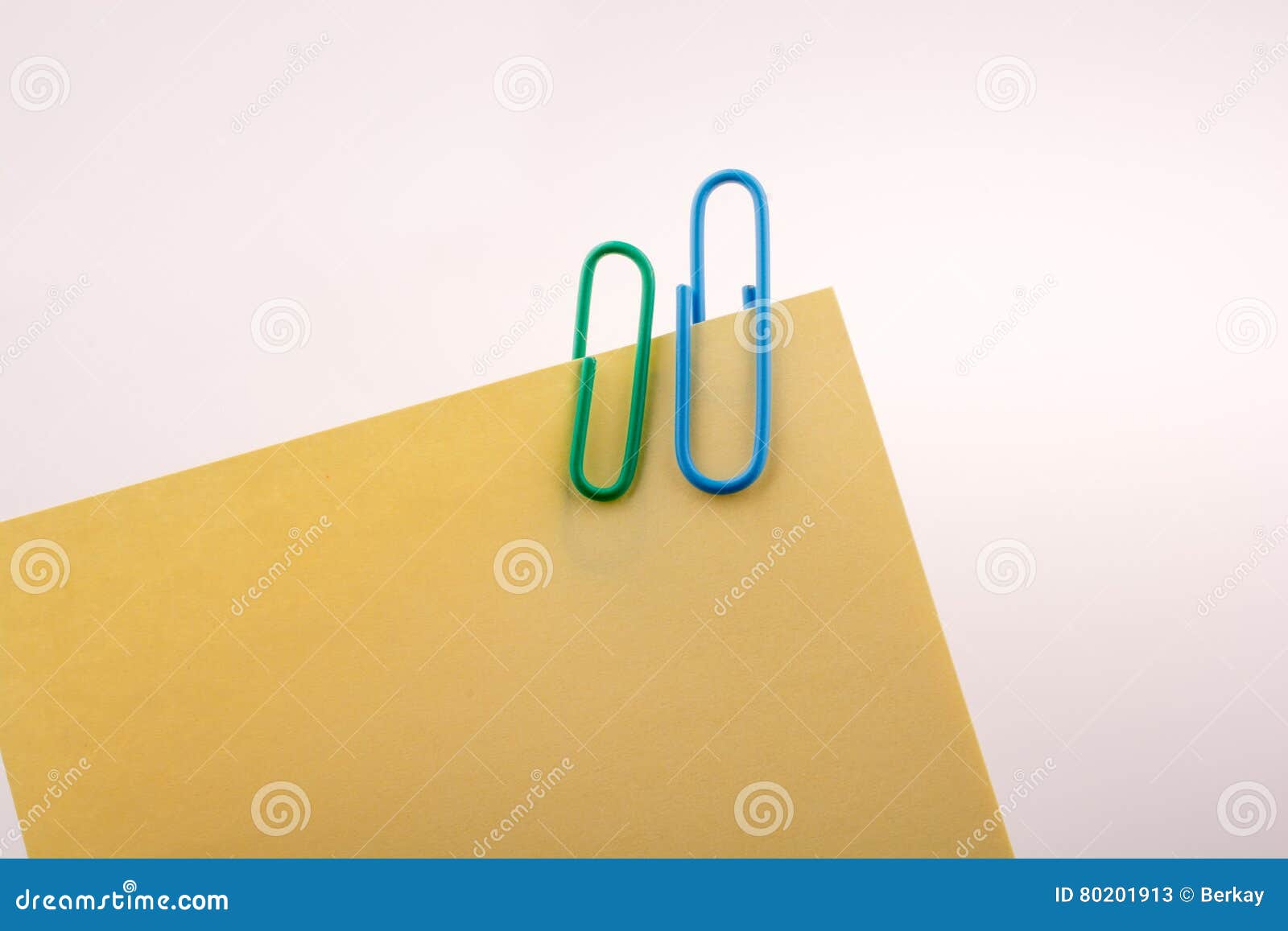 Hand Holding a Note Paper with Paper Clips Stock Image - Image of ...