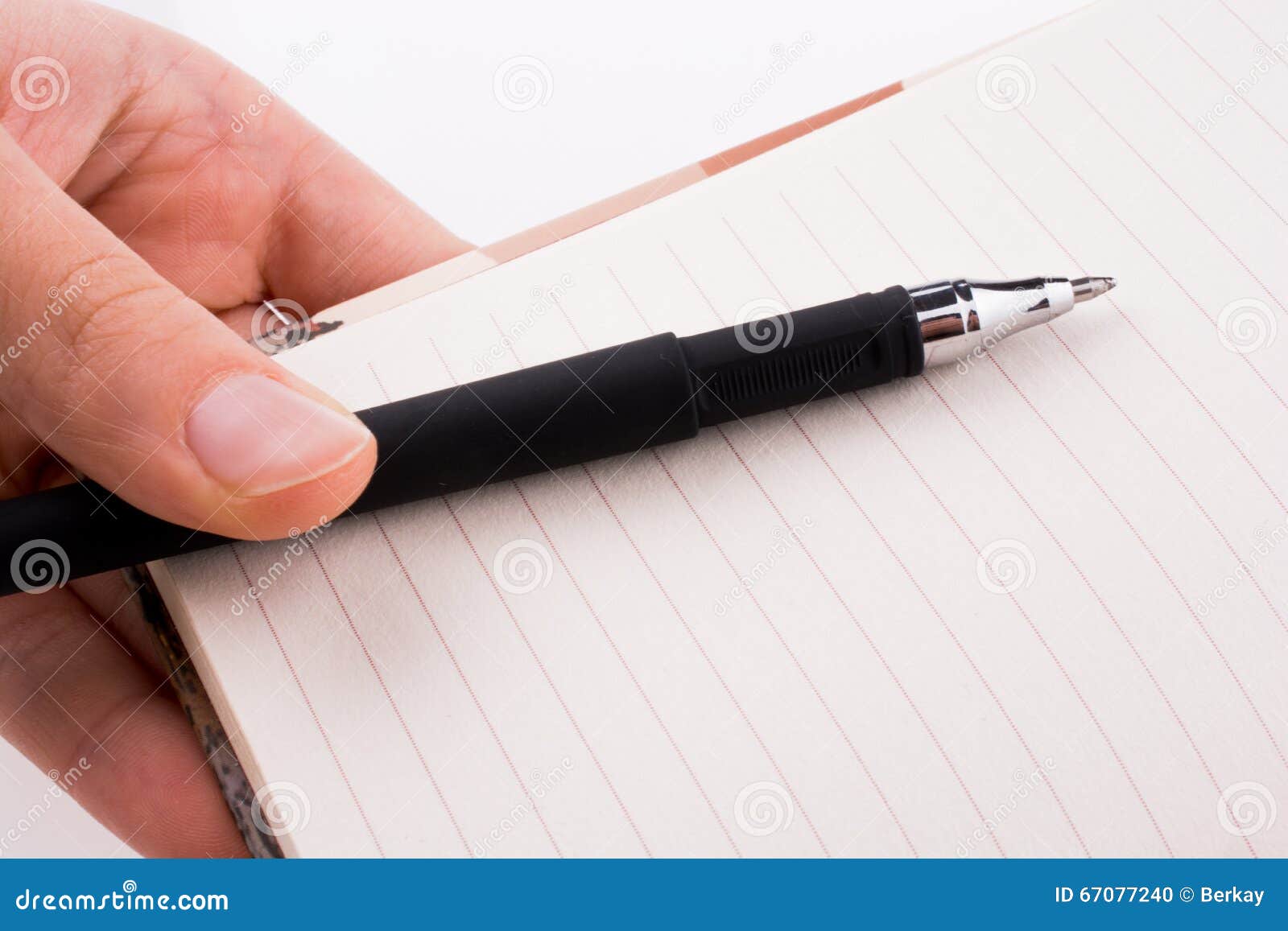 Hand holding notebook stock photo. Image of educate, classroom - 67077240