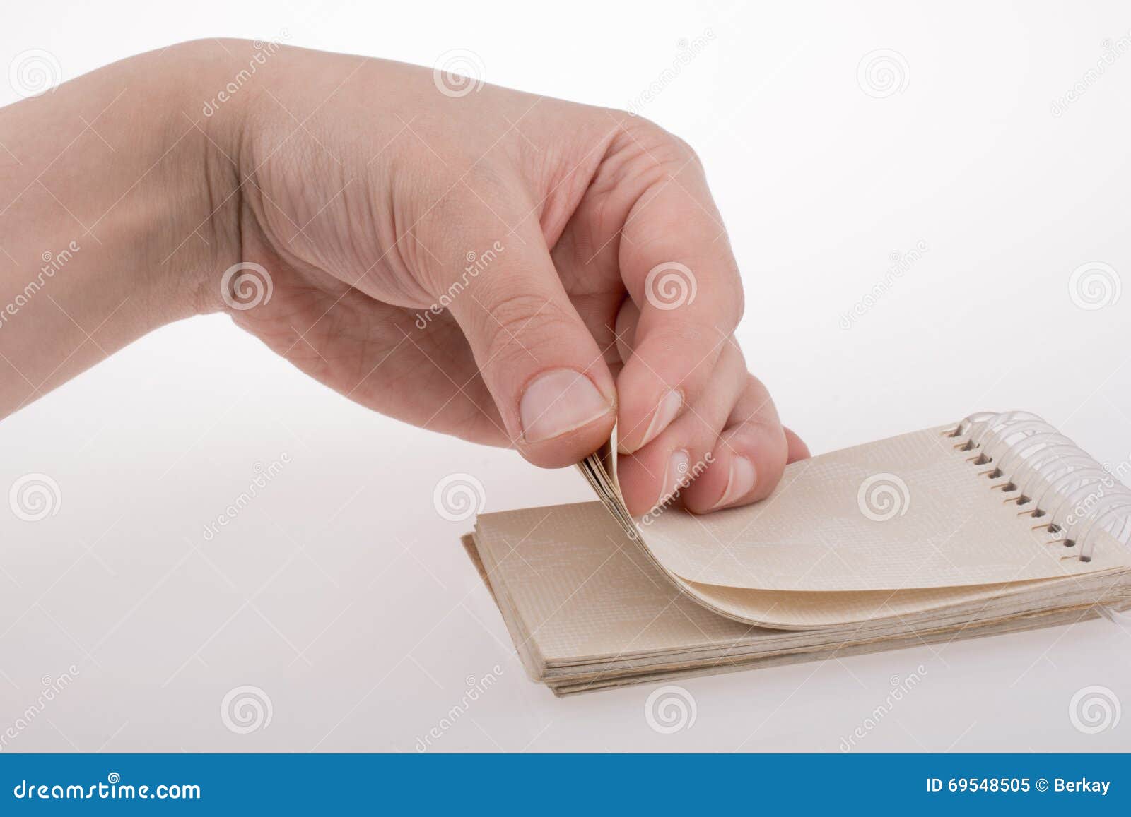 Hand holding a notebook stock image. Image of holding - 69548505