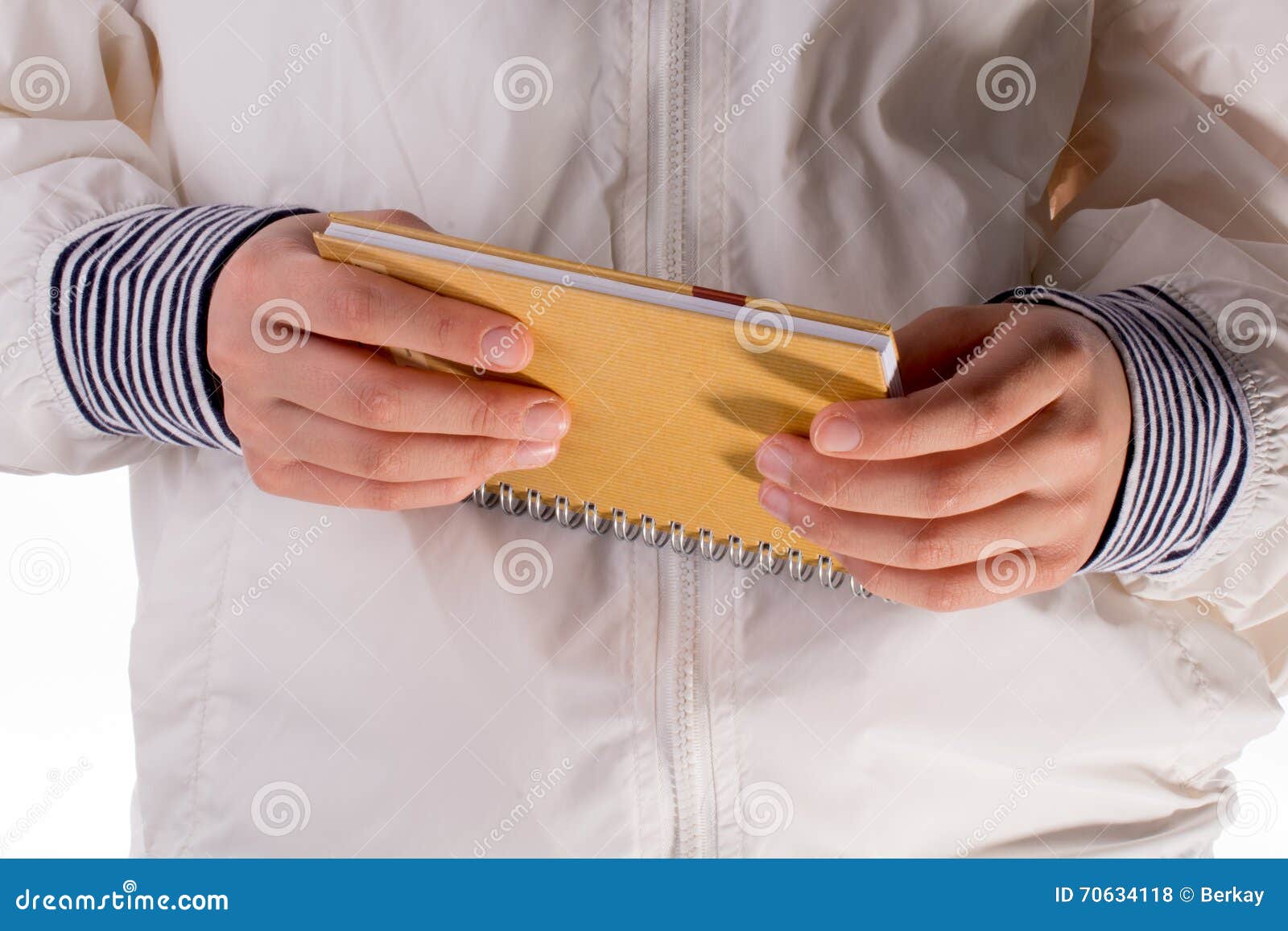 Hand holding a notebook stock photo. Image of paper, page - 70634118