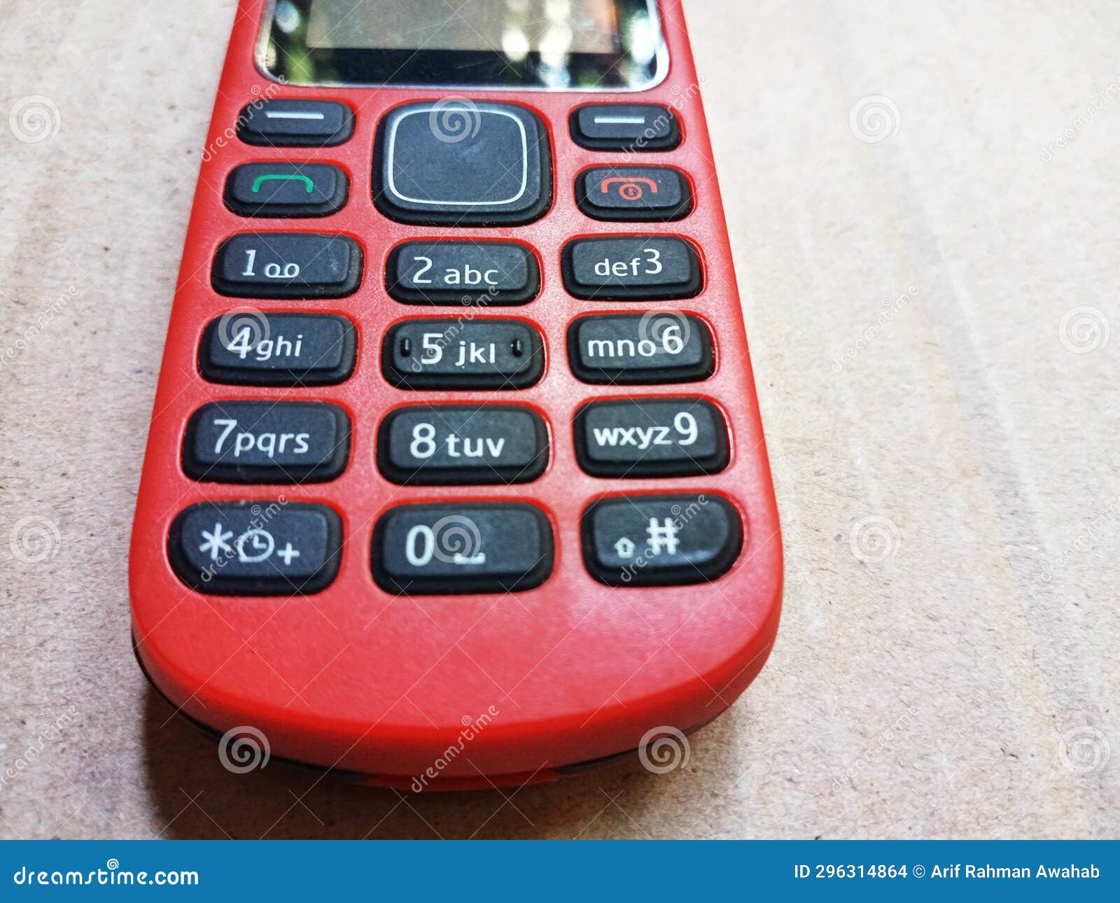 Hand Holding Old Mobile Phone with Texting or SMS Button Keyboard or ...