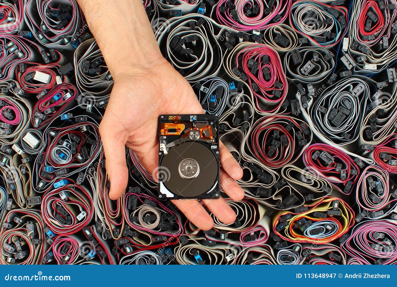 Hand Holding Open Hard Disk Drive, Against Computer Cables Stock Image ...