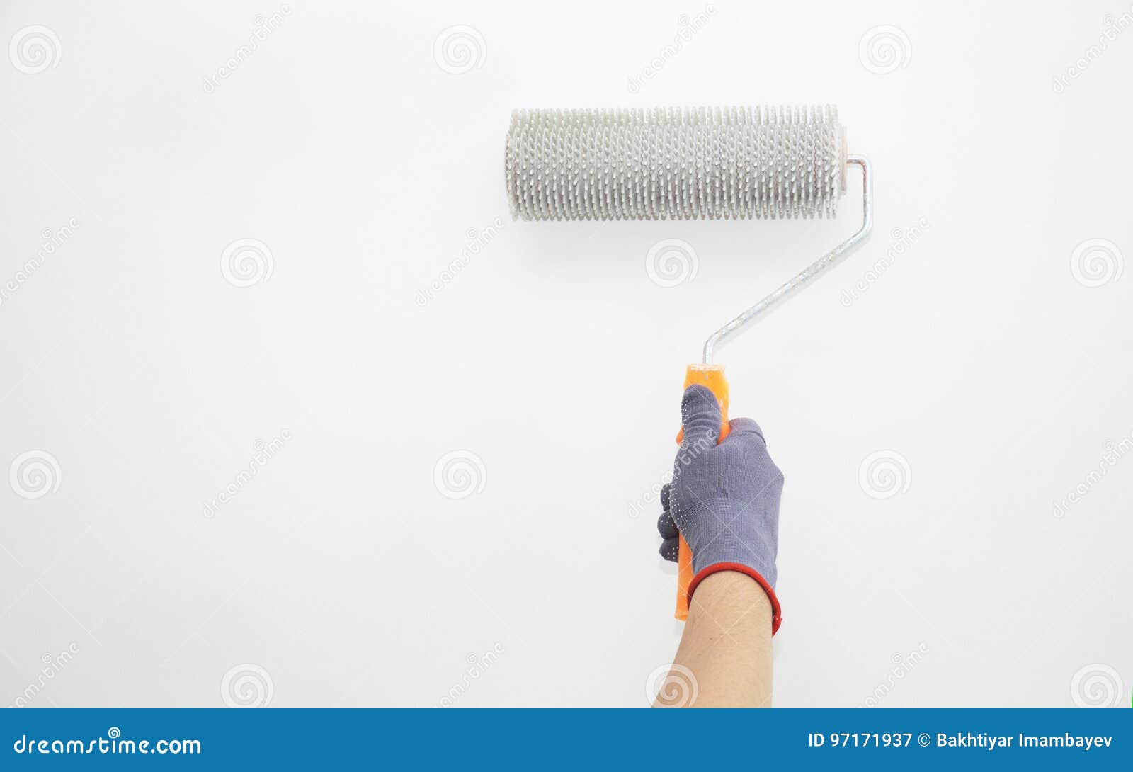 Hand holding paint roller stock image. Image of house - 97171937