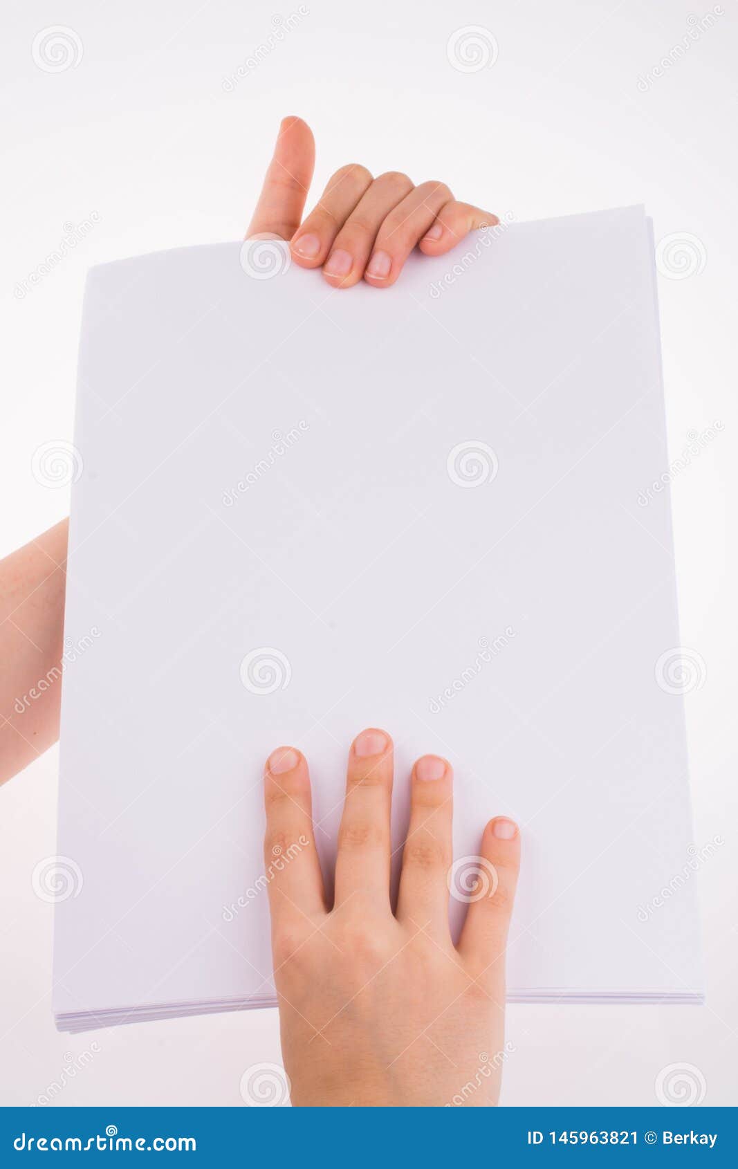 Hand holding a paper stock image. Image of hands, human - 145963821
