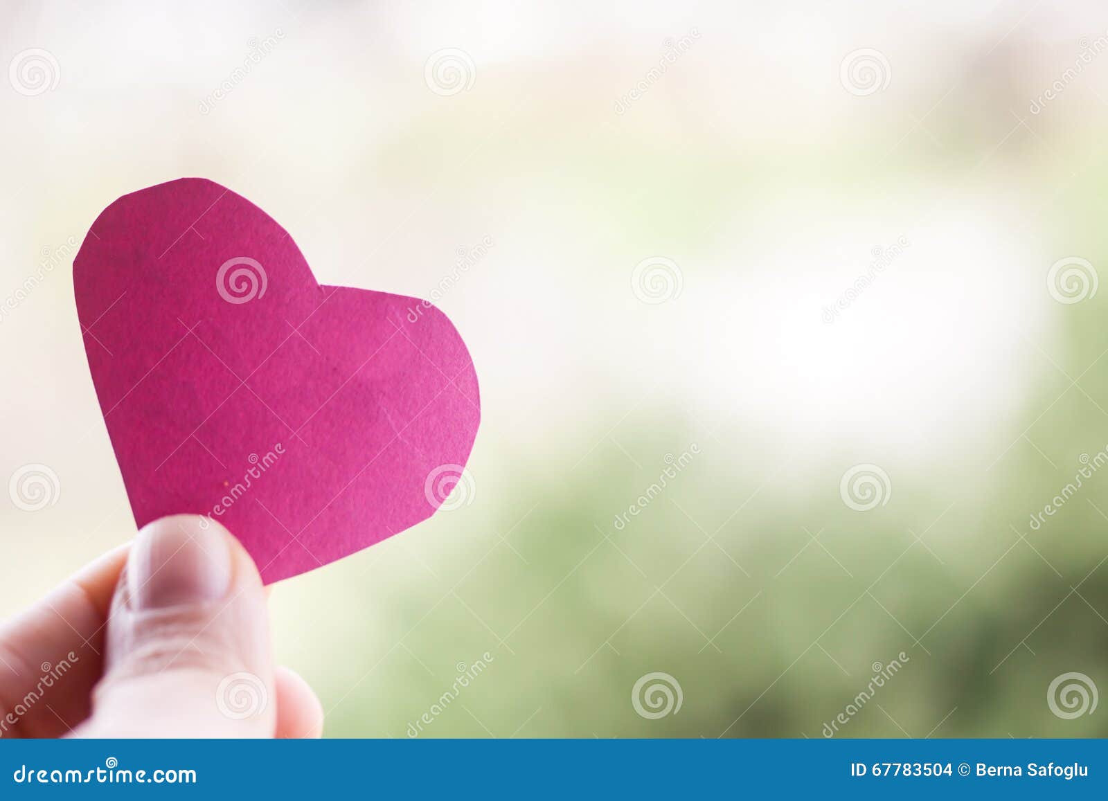 Hand holding paper heart stock photo. Image of romantic - 67783504