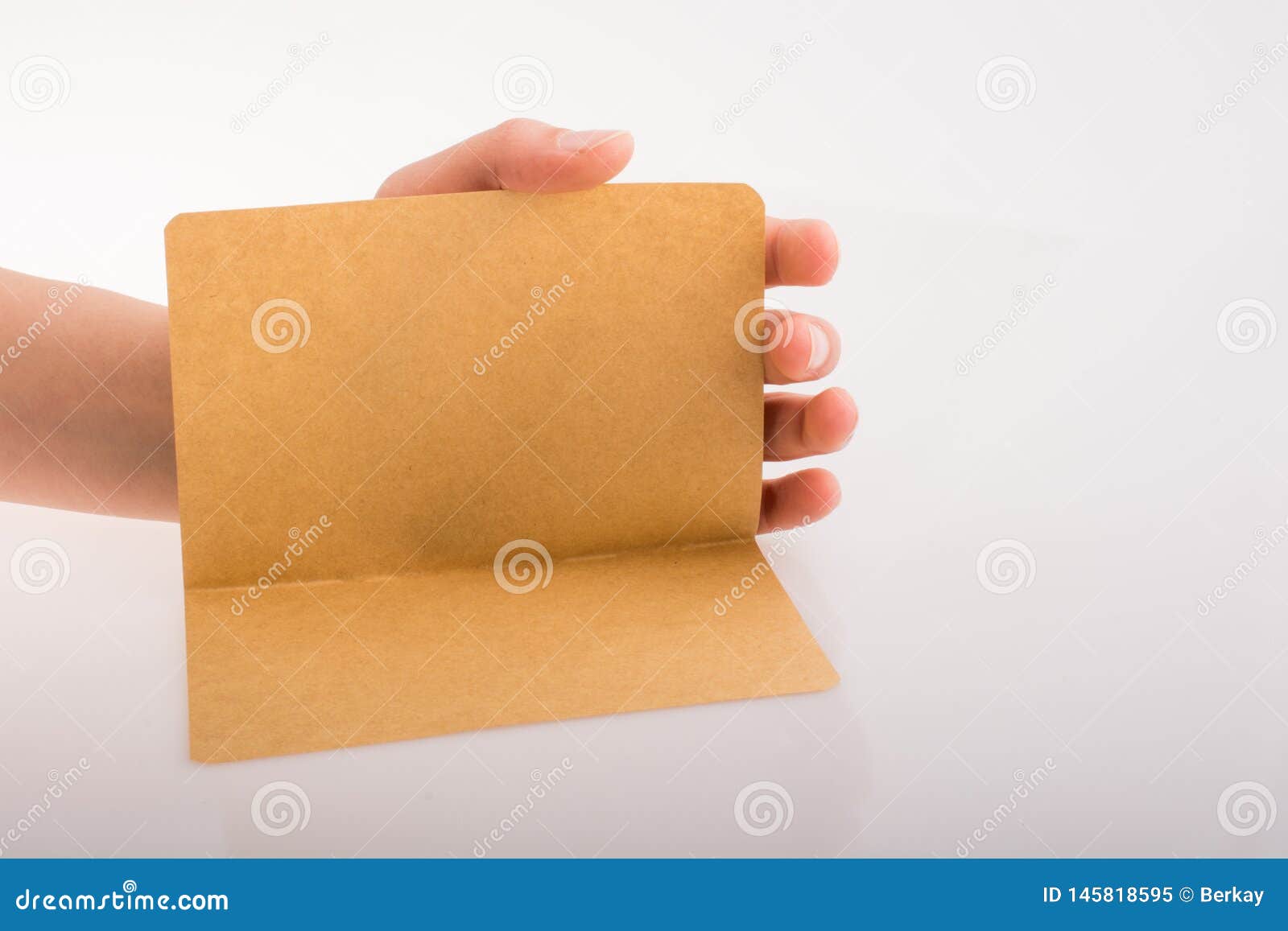 Hand holding a paper stock image. Image of classroom - 145818595
