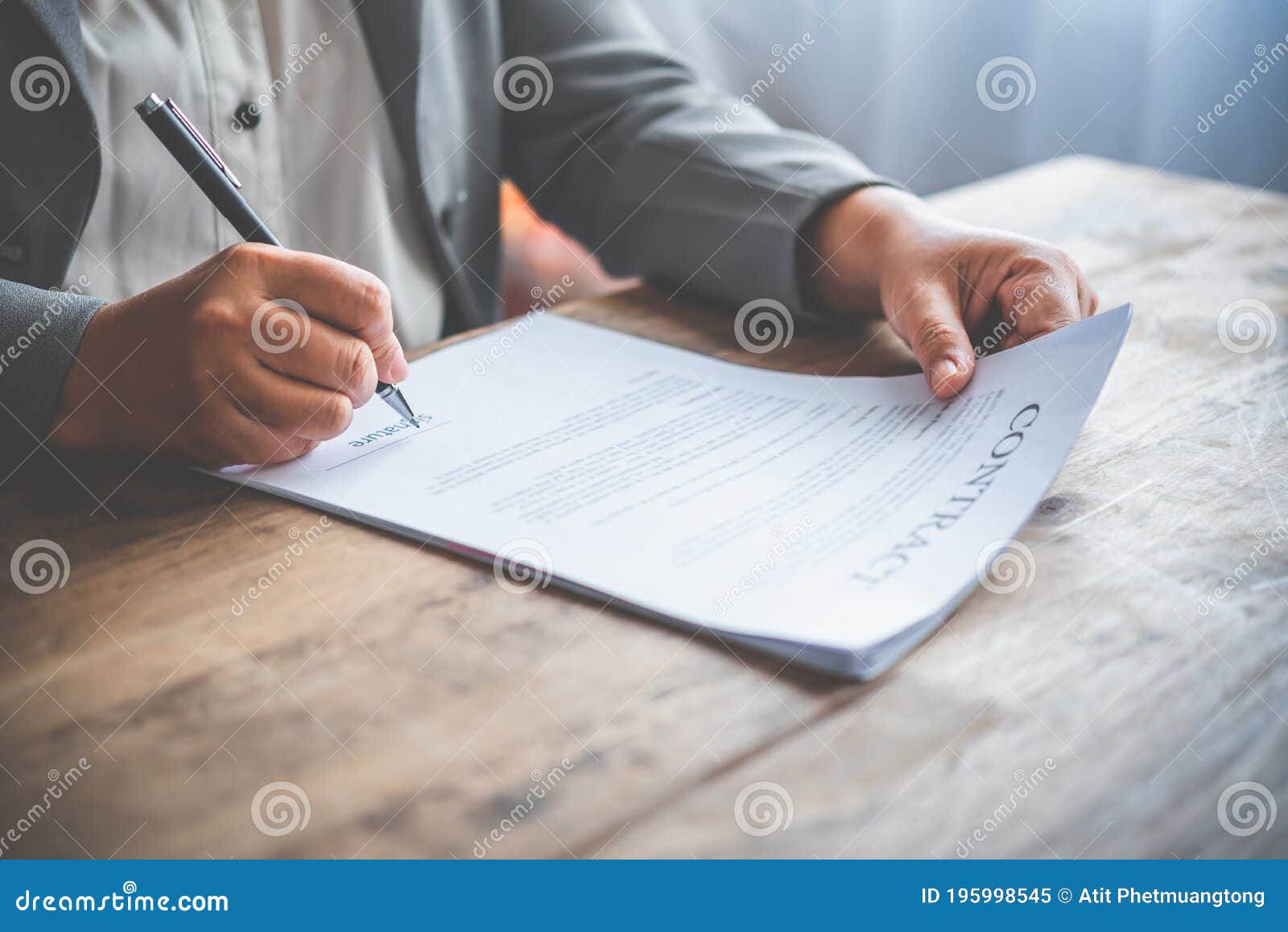 Hand Holding Pen Signing Contract in Important Documents Stock Image ...
