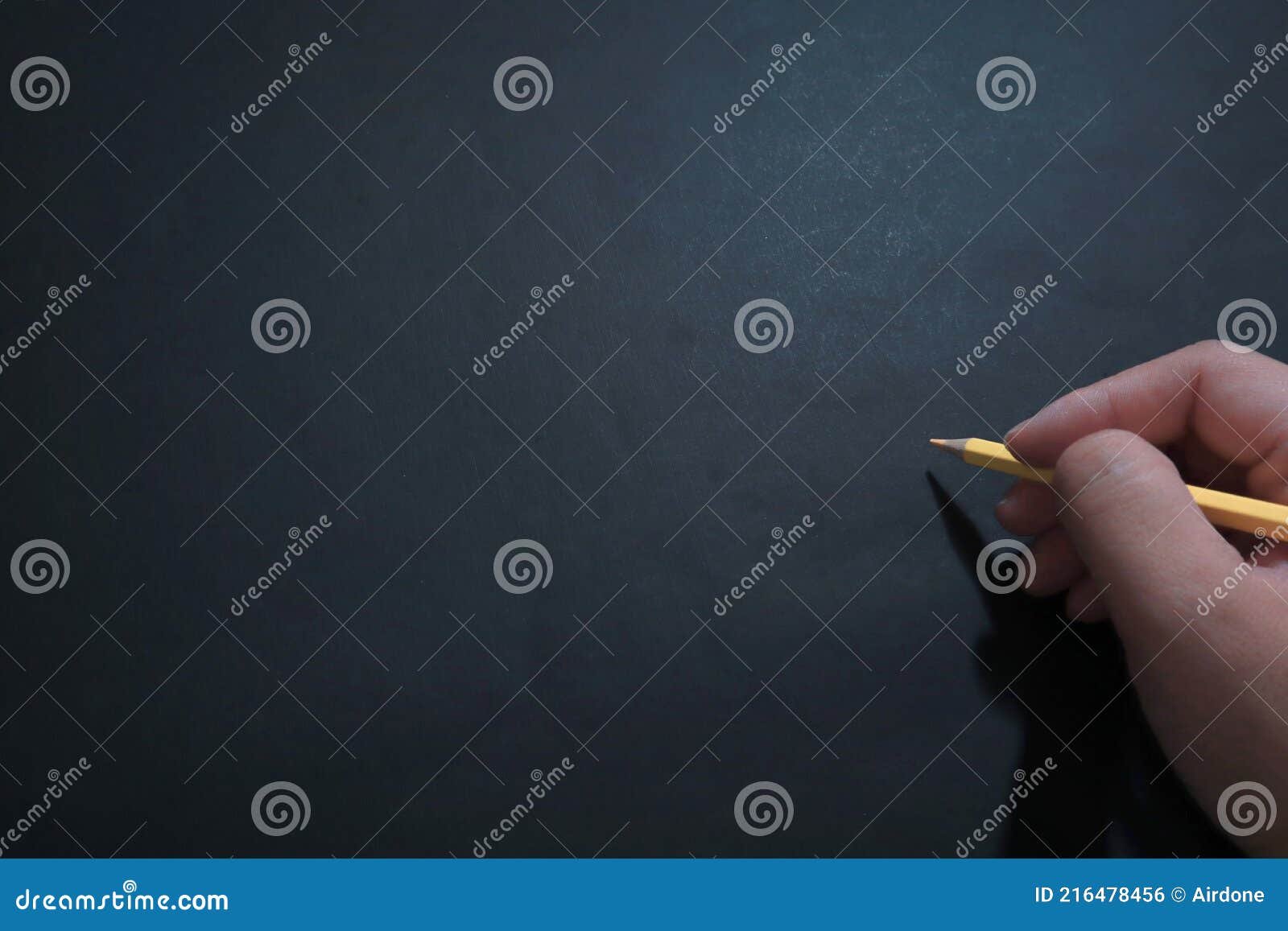 Hand Holding Pencil in Writing Position, Over Dark Black Background ...