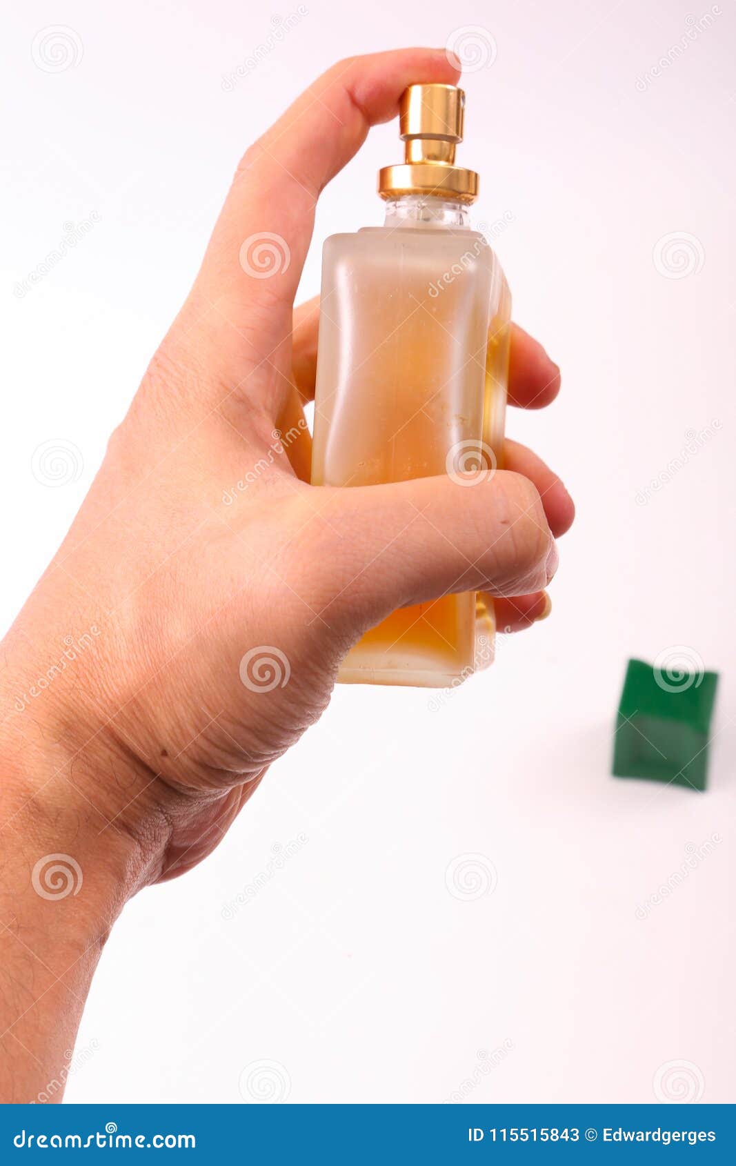Hand Holding Perfume Bottle Stock Image - Image of abstract, fragrance ...