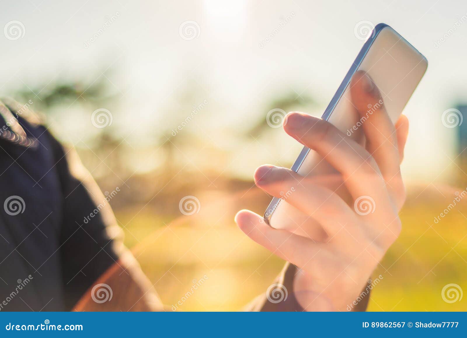 Hand Holding Phone Close-up Stock Image - Image of outdoor, background ...