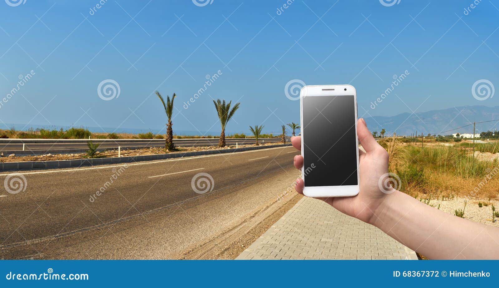 Hand Holding a Phone on the Road Stock Photo - Image of design, exotic ...