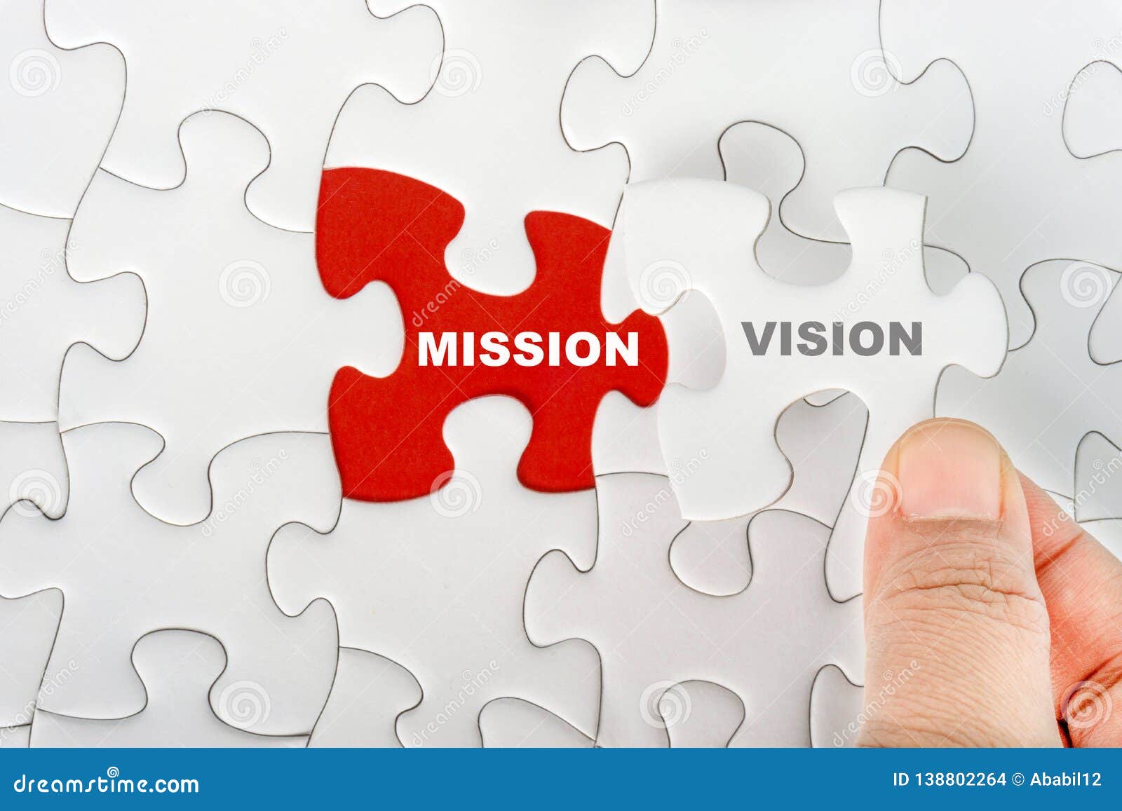 Hand Holding Piece of Jigsaw Puzzle with Word MISSION VISION Stock ...