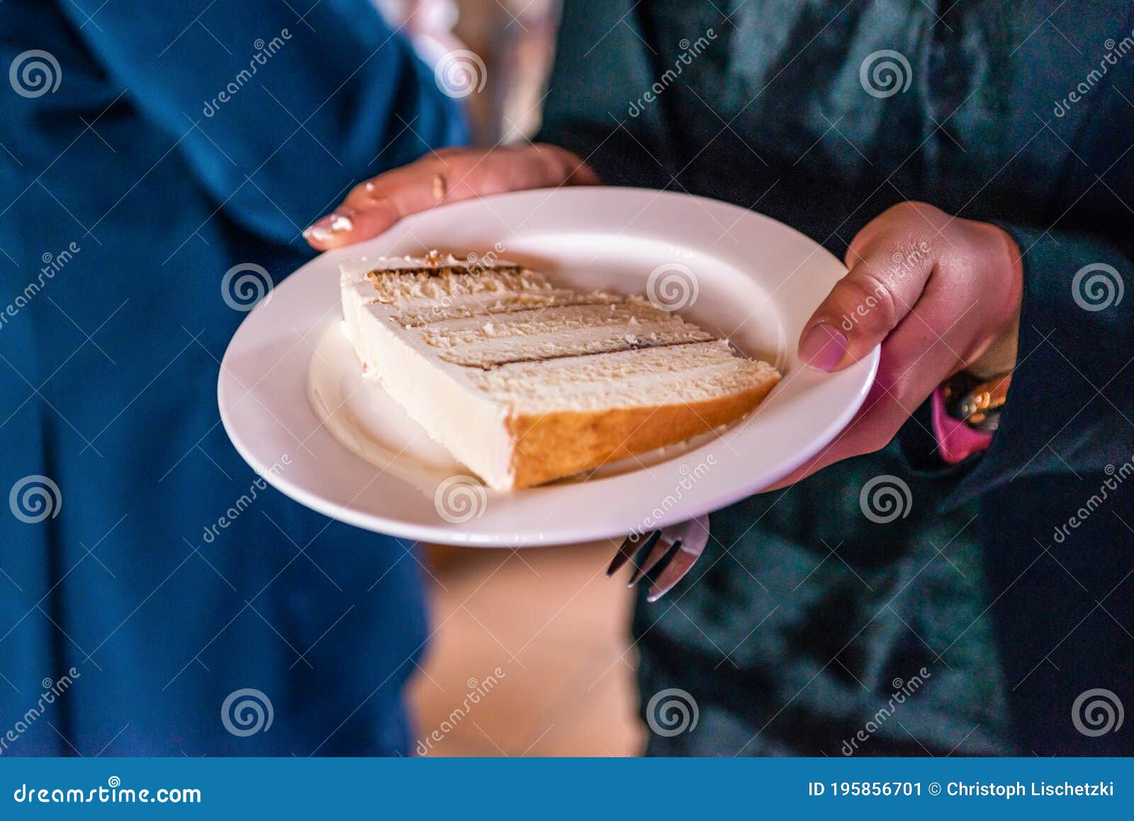 Hand Holding a Piece of Multi Layer Wedding Cake on a Plate Stock Image ...