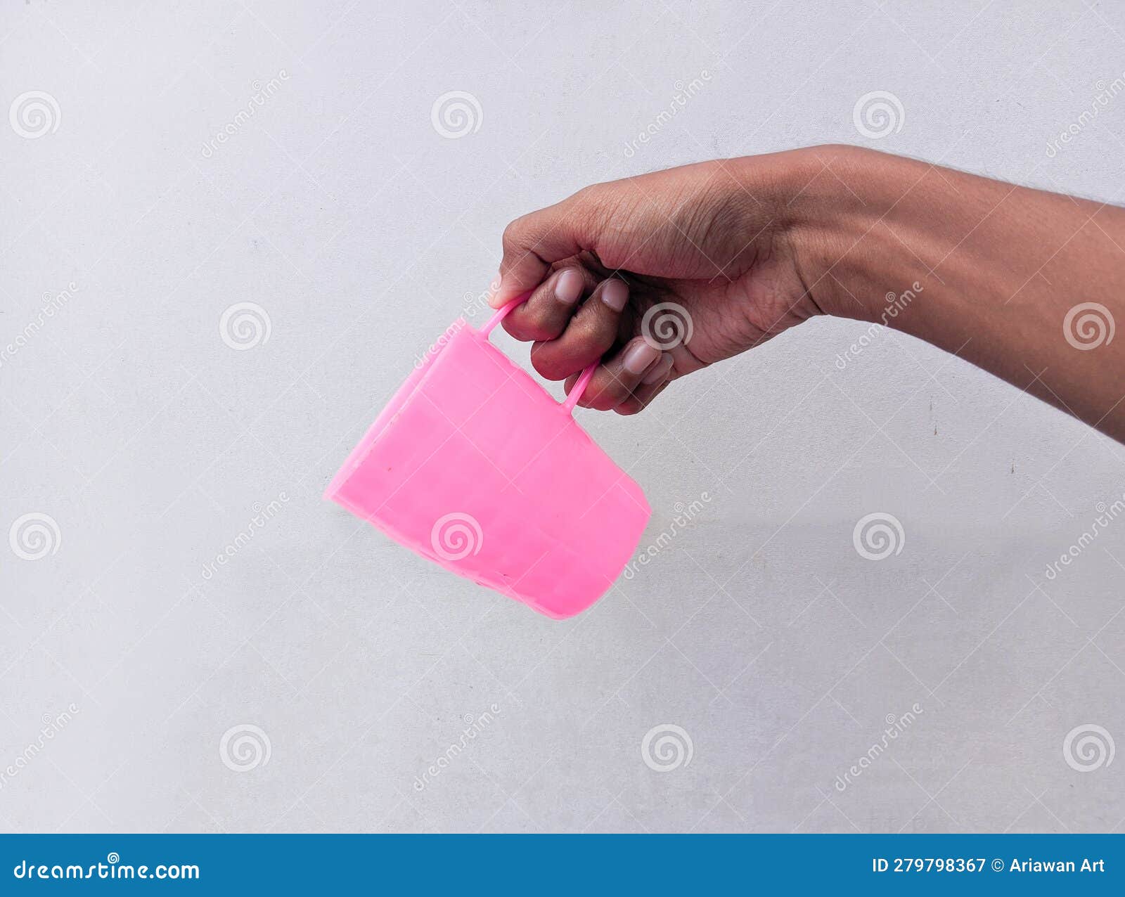 Hand Holding Pink Plastic Cup on White Background. Stock Image - Image ...