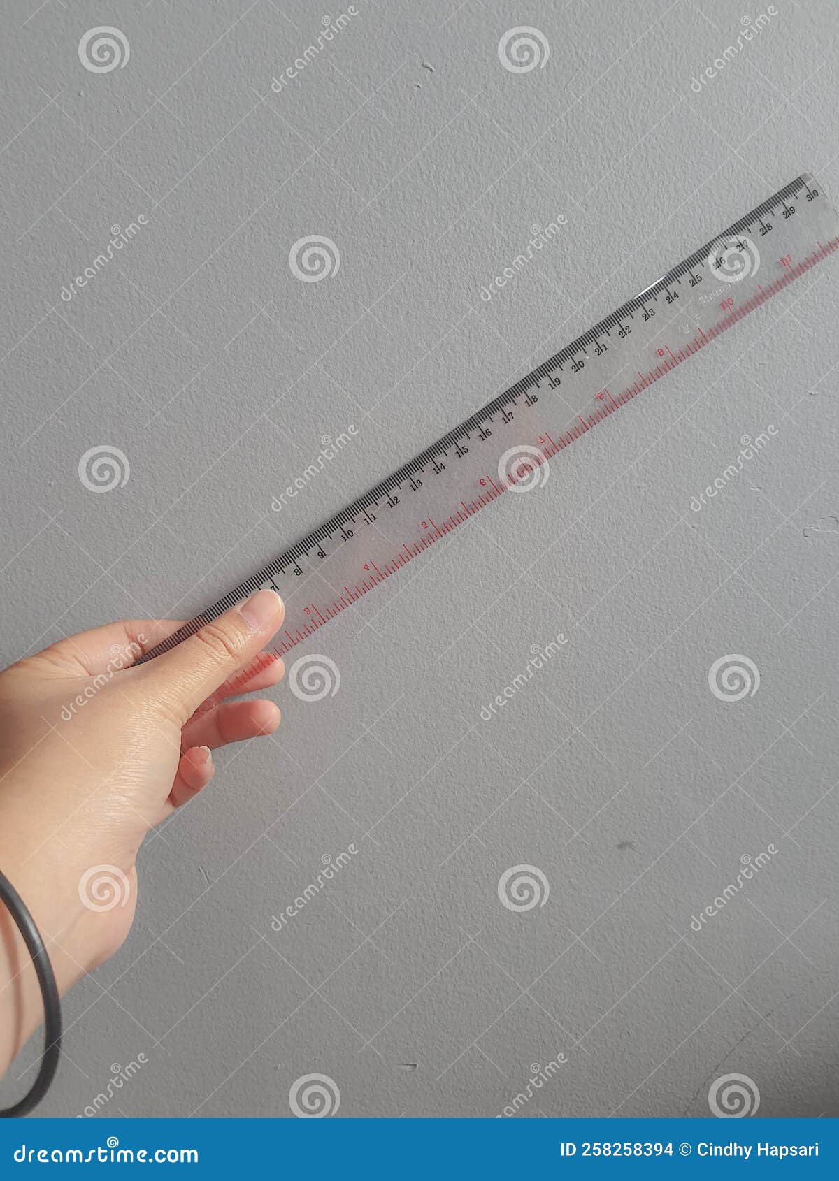 A Hand is Holding a Plastic Ruler Stock Photo - Image of geometric ...