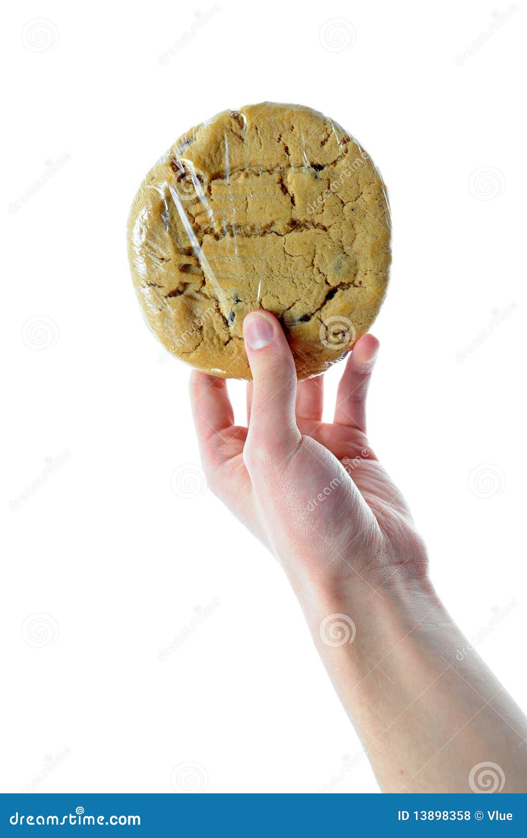 Hand Holding Plastic Wrapped Cookie Stock Photo - Image of hand ...
