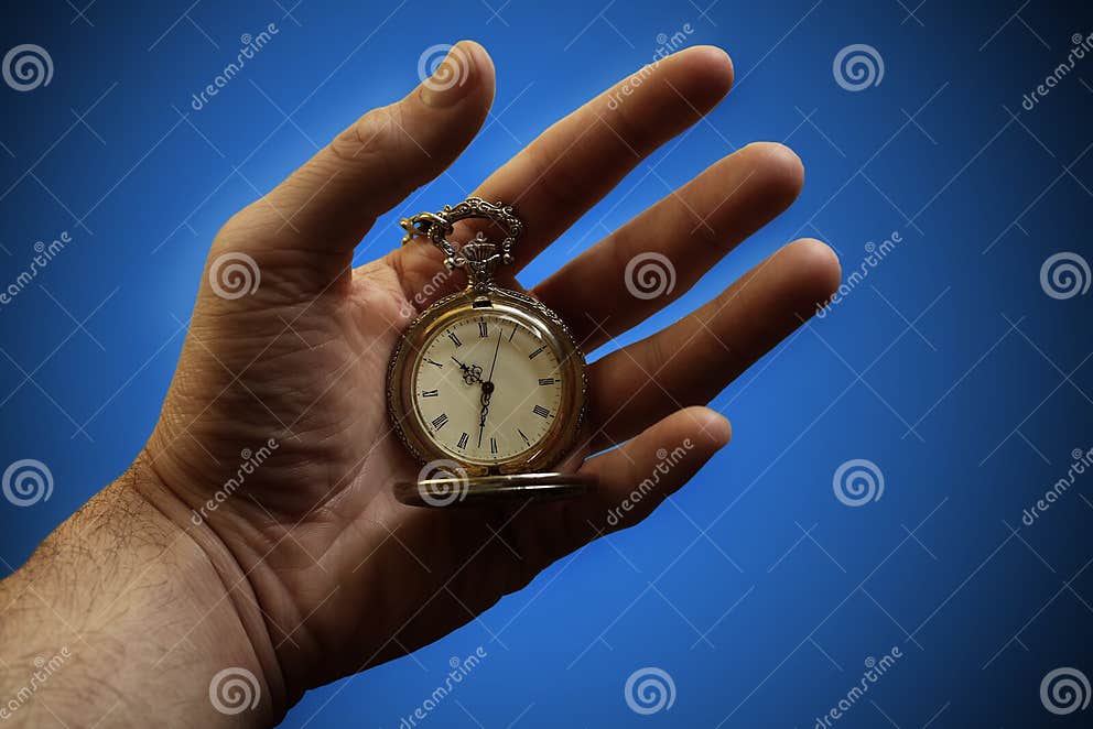 Hand holding pocket watch stock photo. Image of holding - 8661688