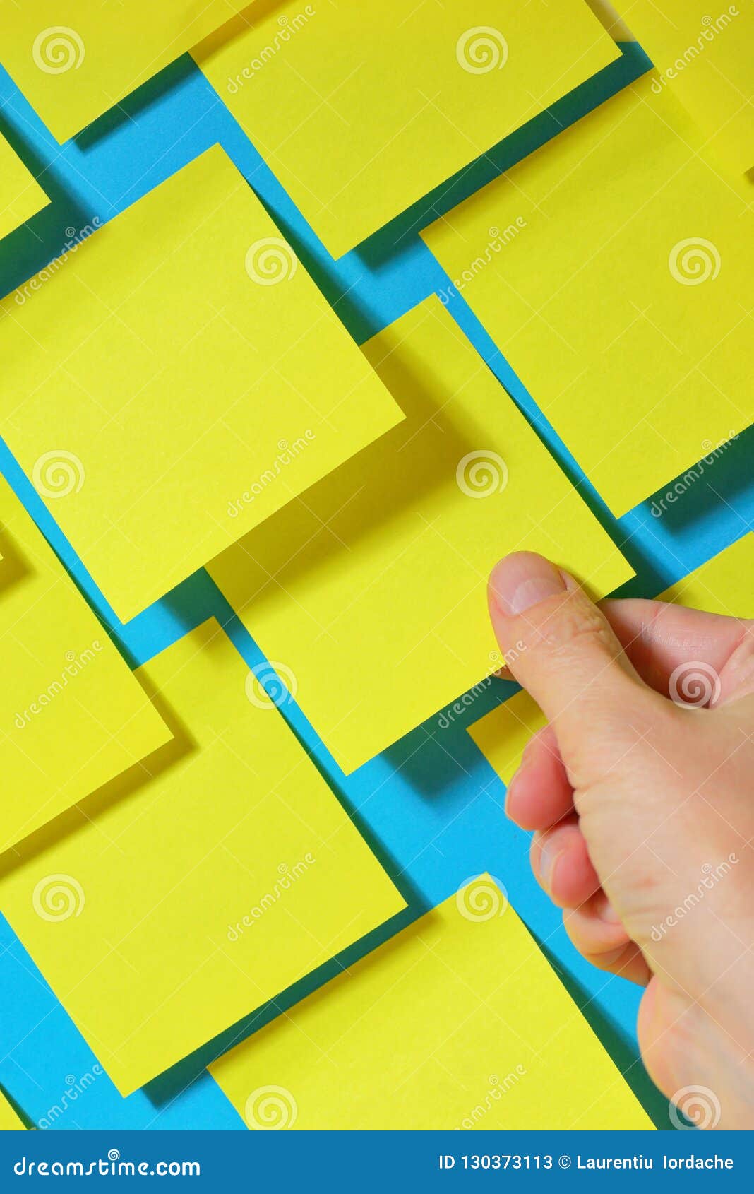 Hand holding post-it note stock image. Image of close - 130373113