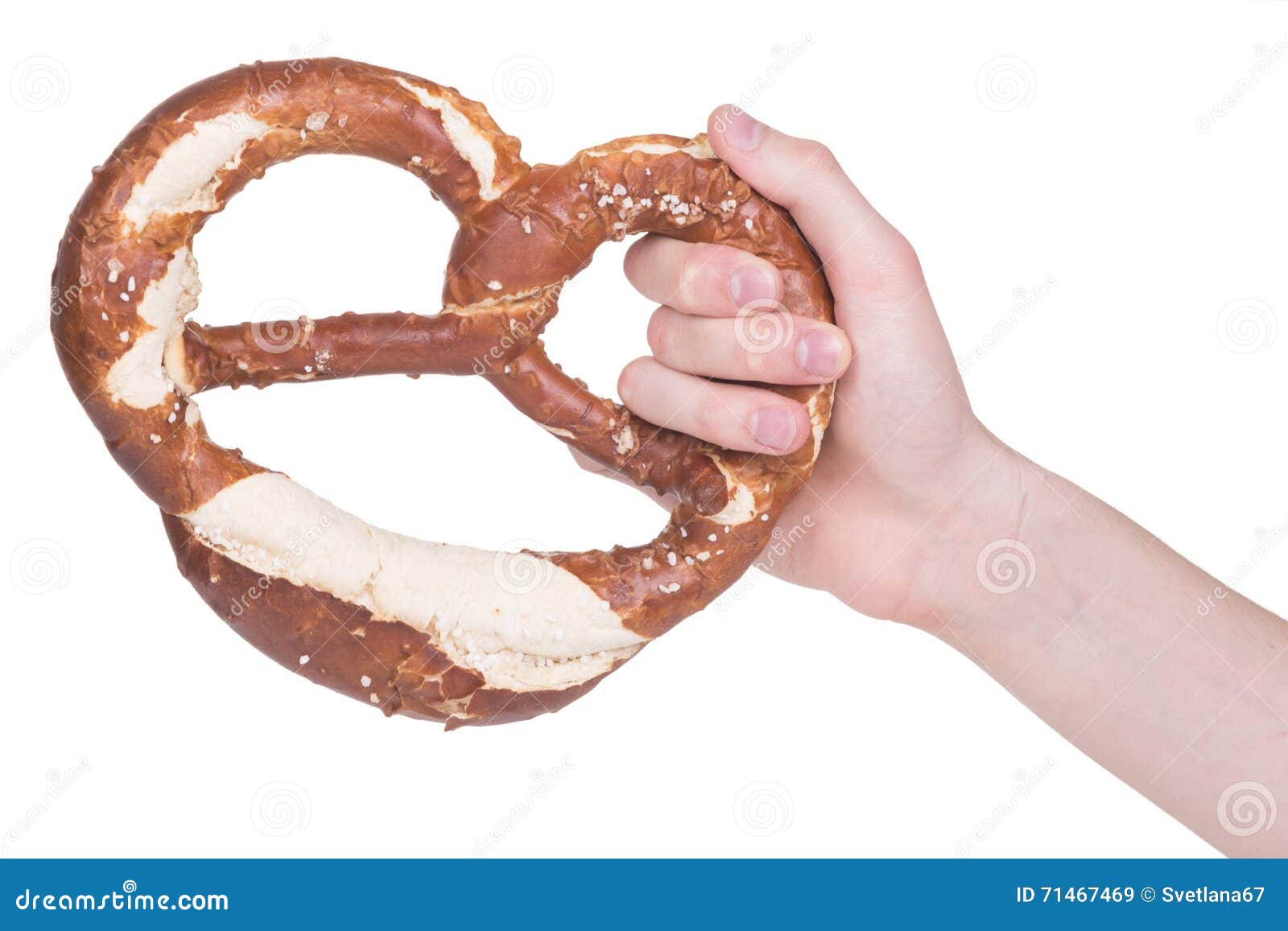 Hand holding pretzel stock image. Image of oktoberfest - 71467469
