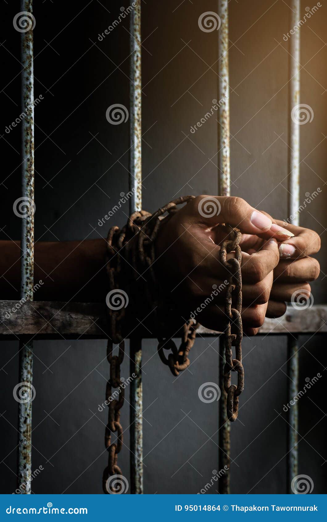 Hand holding prison bar stock photo. Image of arrest - 95014864