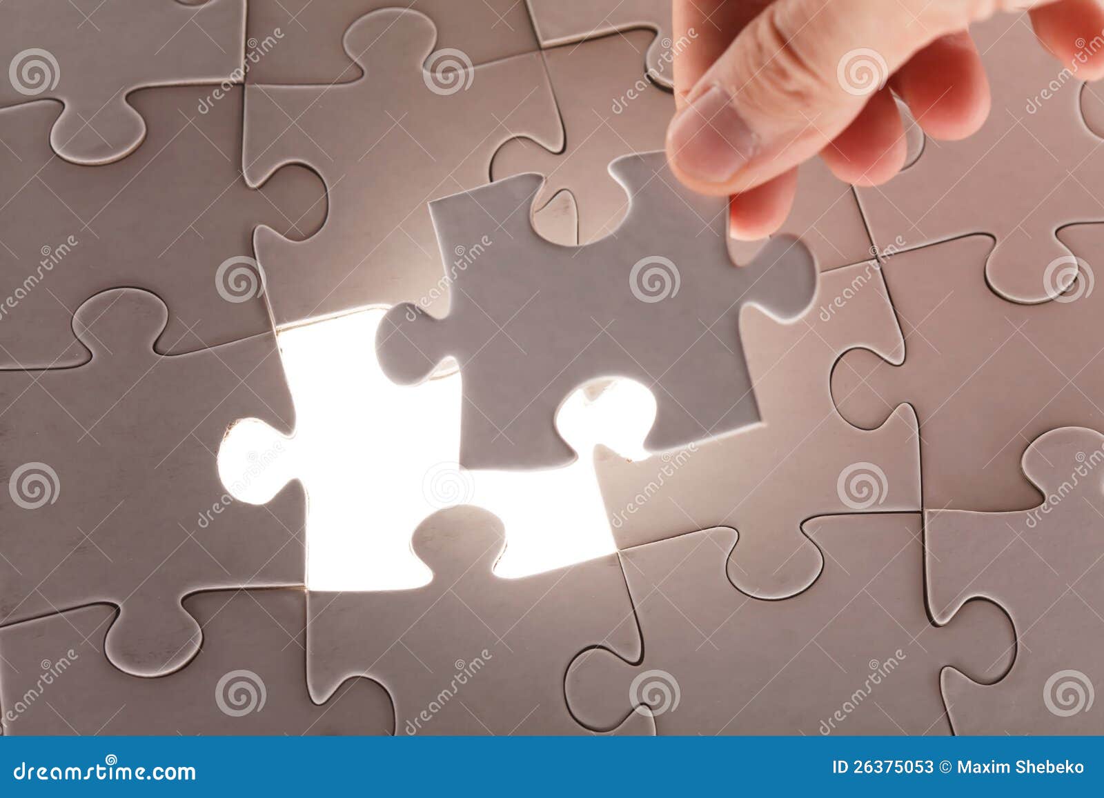 Hand holding puzzle piece stock image. Image of hand - 26375053