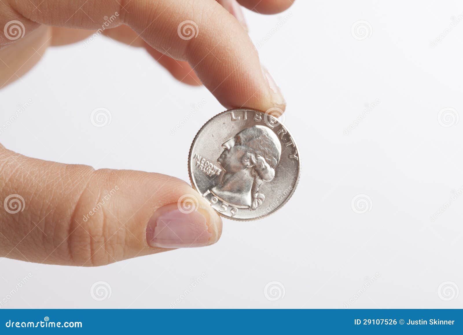Hand Holding Quarter stock photo. Image of closeup, hand - 29107526