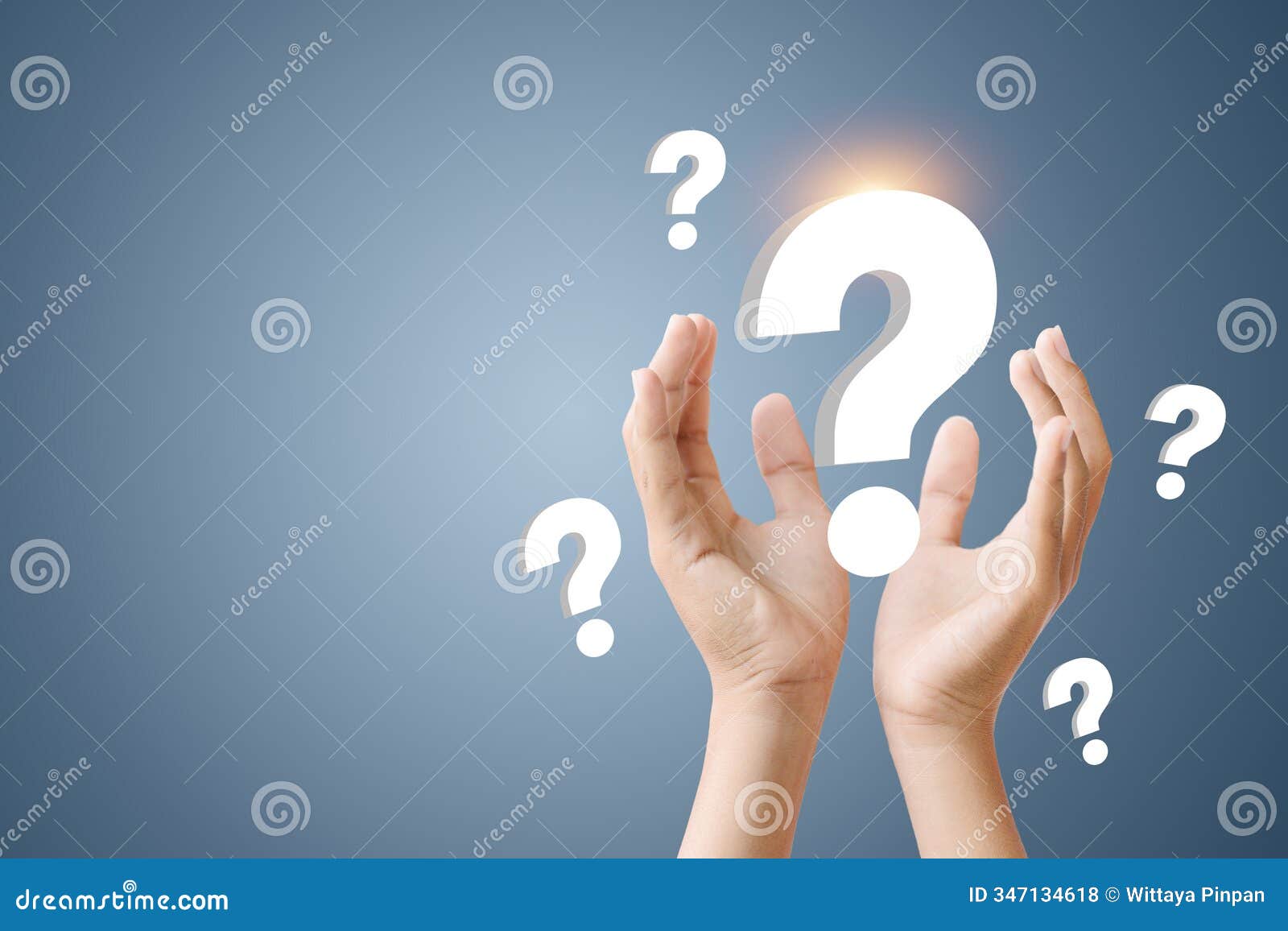 A Hand Holding a Question Mark with Other Question Marks Surrounding it ...