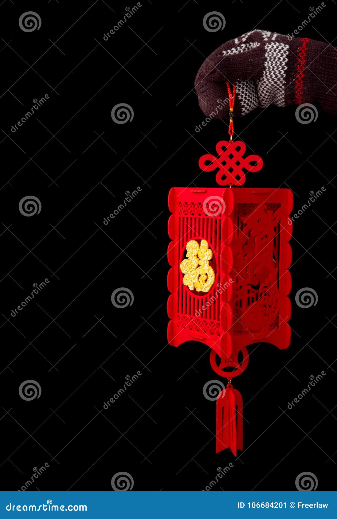 Hand Holding a Rectangle Shape Lantern for Chinese New Year on Black ...