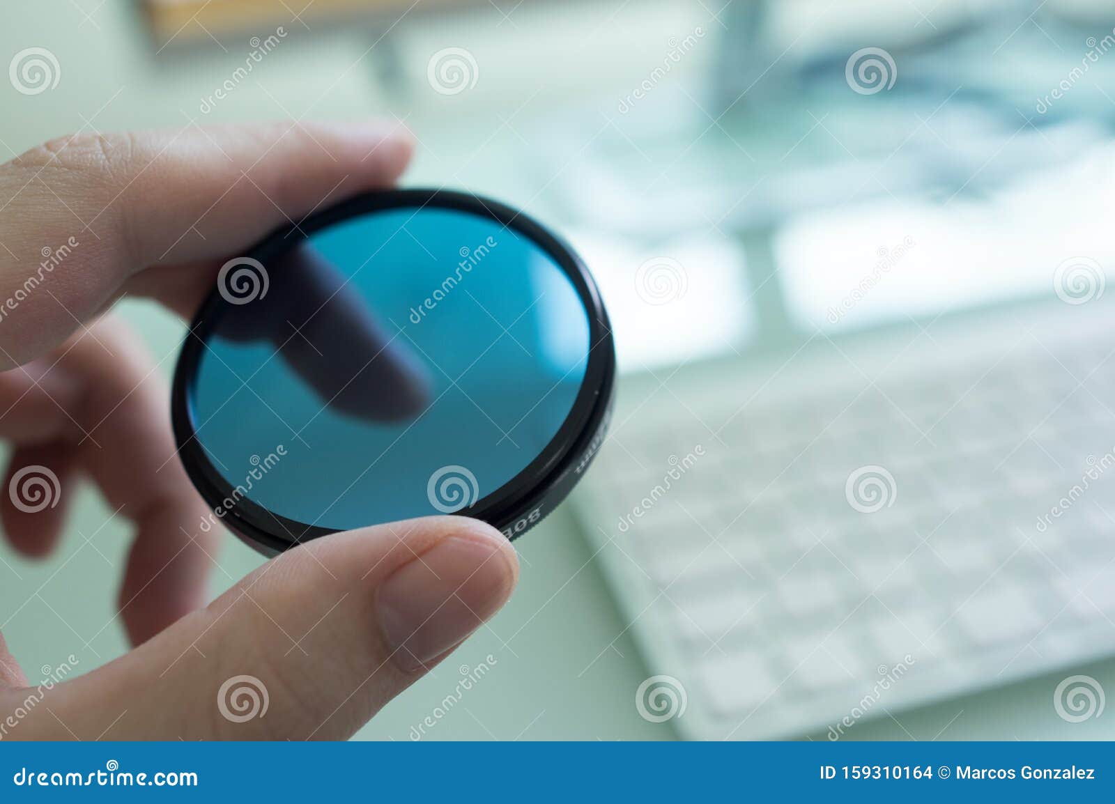 Hand Holding a Reflex Camera Blue Filter Stock Photo - Image of ...