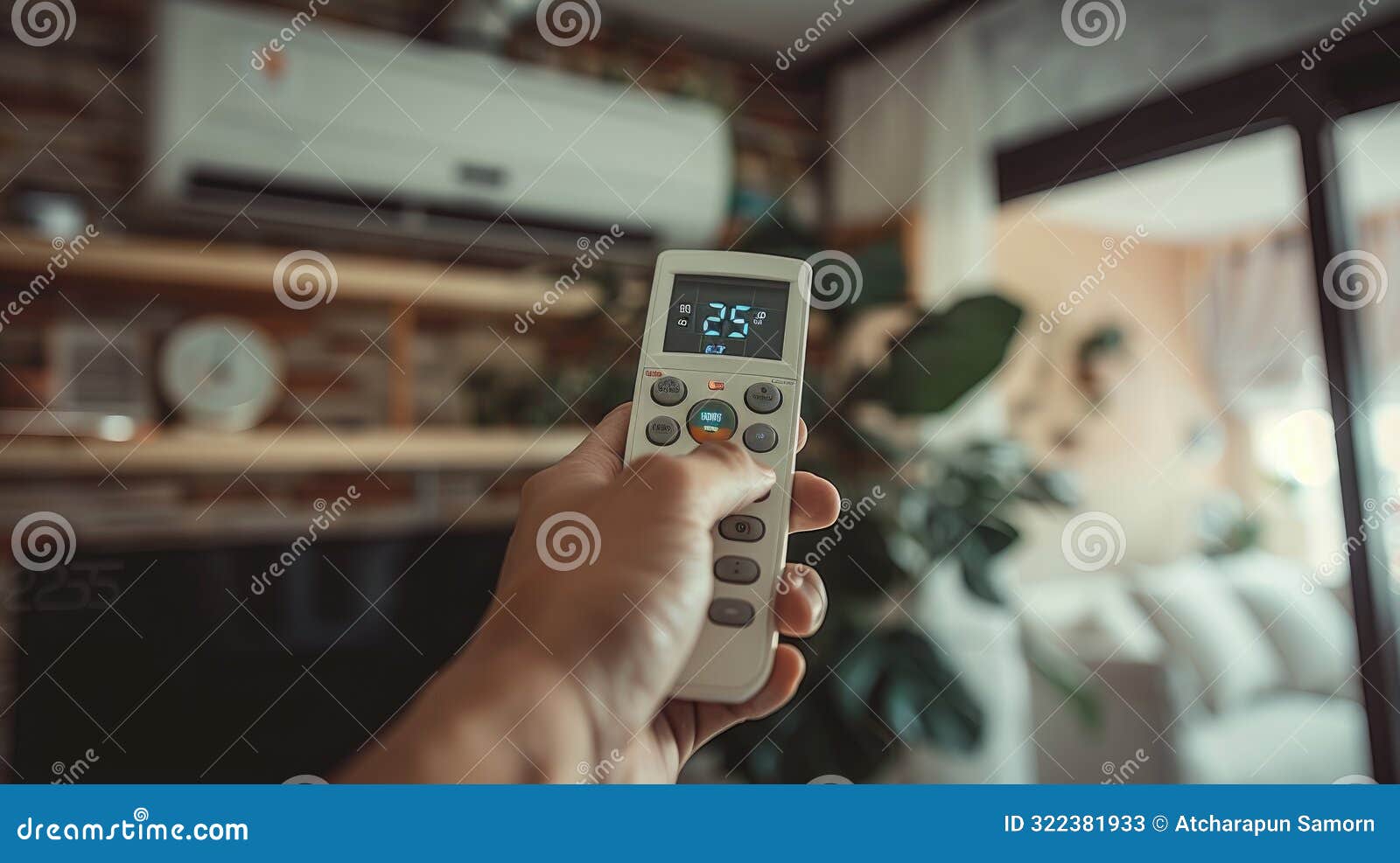 Hand Holding Remote Air Conditioner Controller with Buttons and Display ...