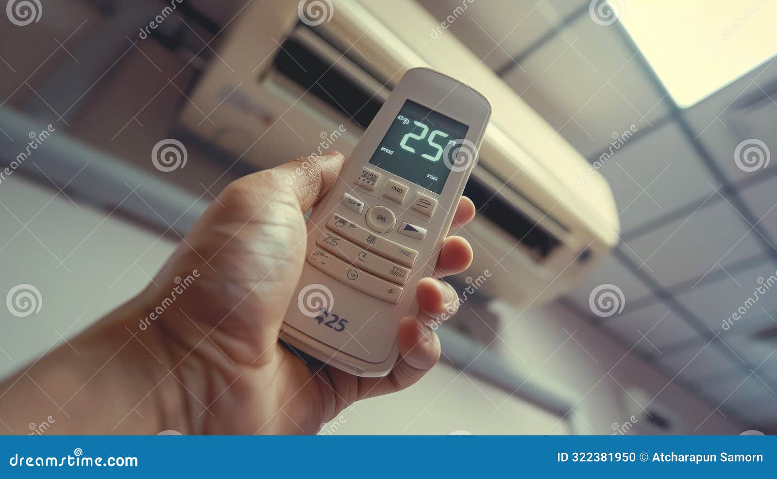 Hand Holding Remote Air Conditioner Controller with Buttons and Display ...